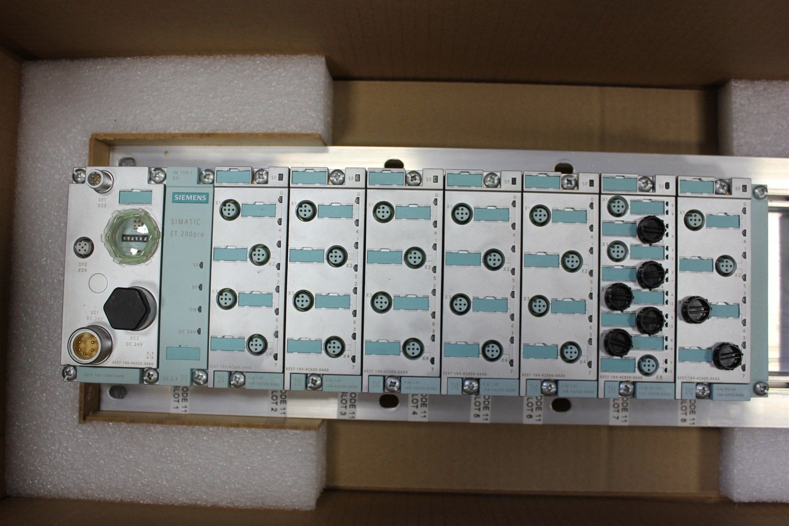 New Siemens simatic Et200 pro PLC i/o rack with modules. Unit has the ...