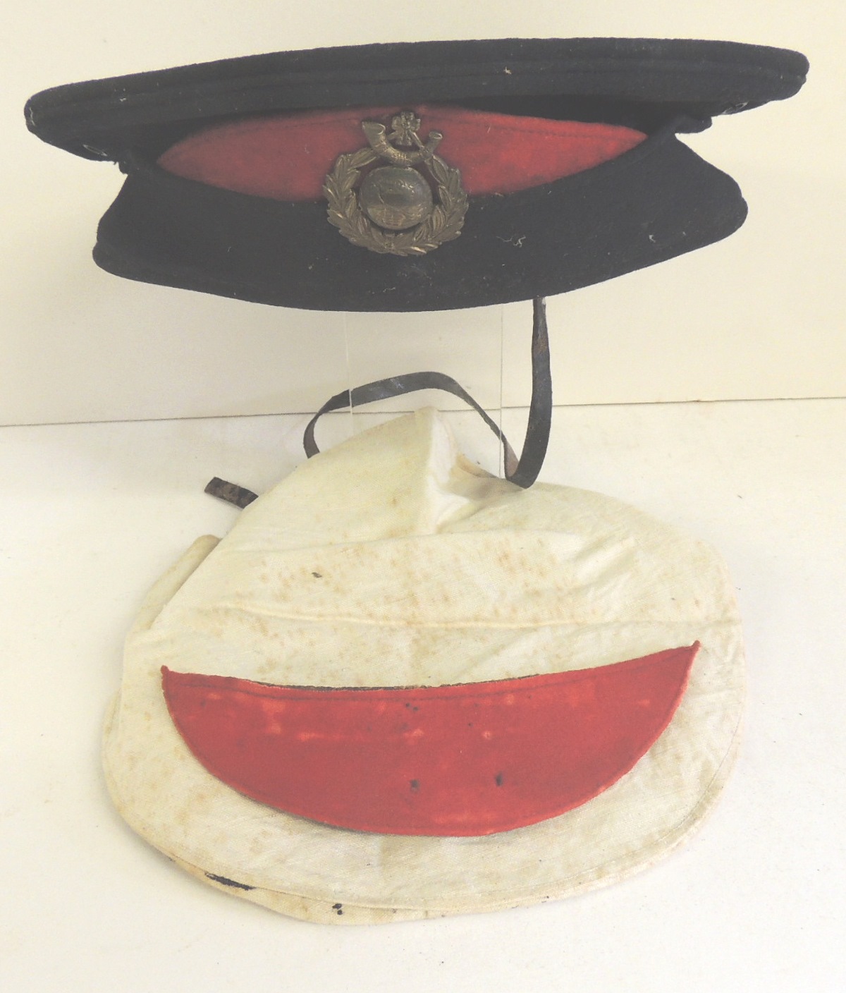 A Royal Marine Light Infantry Broderick cap with original brass badge ...