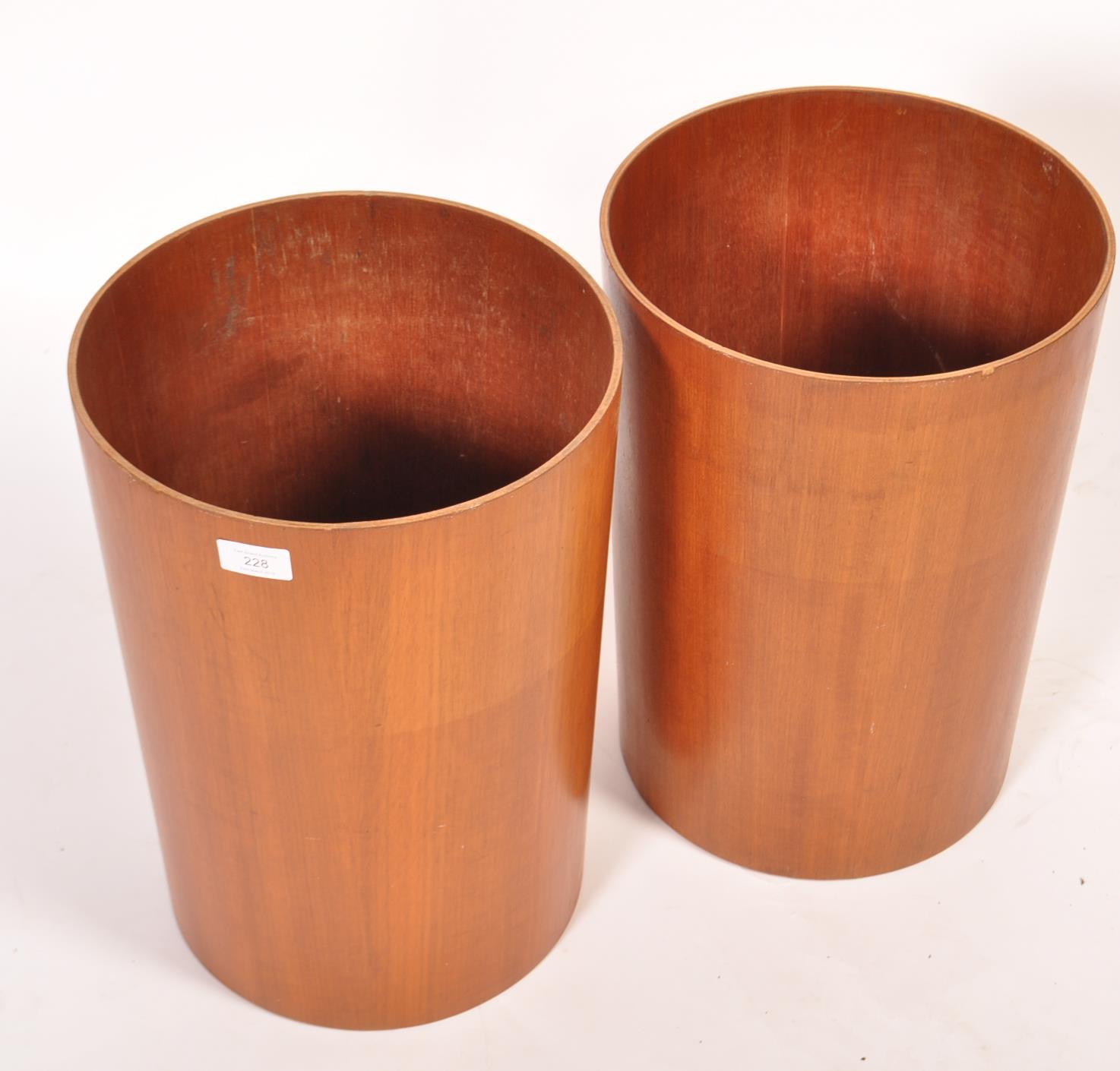 A pair of 1960's mid century retro teak wood cylinder waste paper bin ...