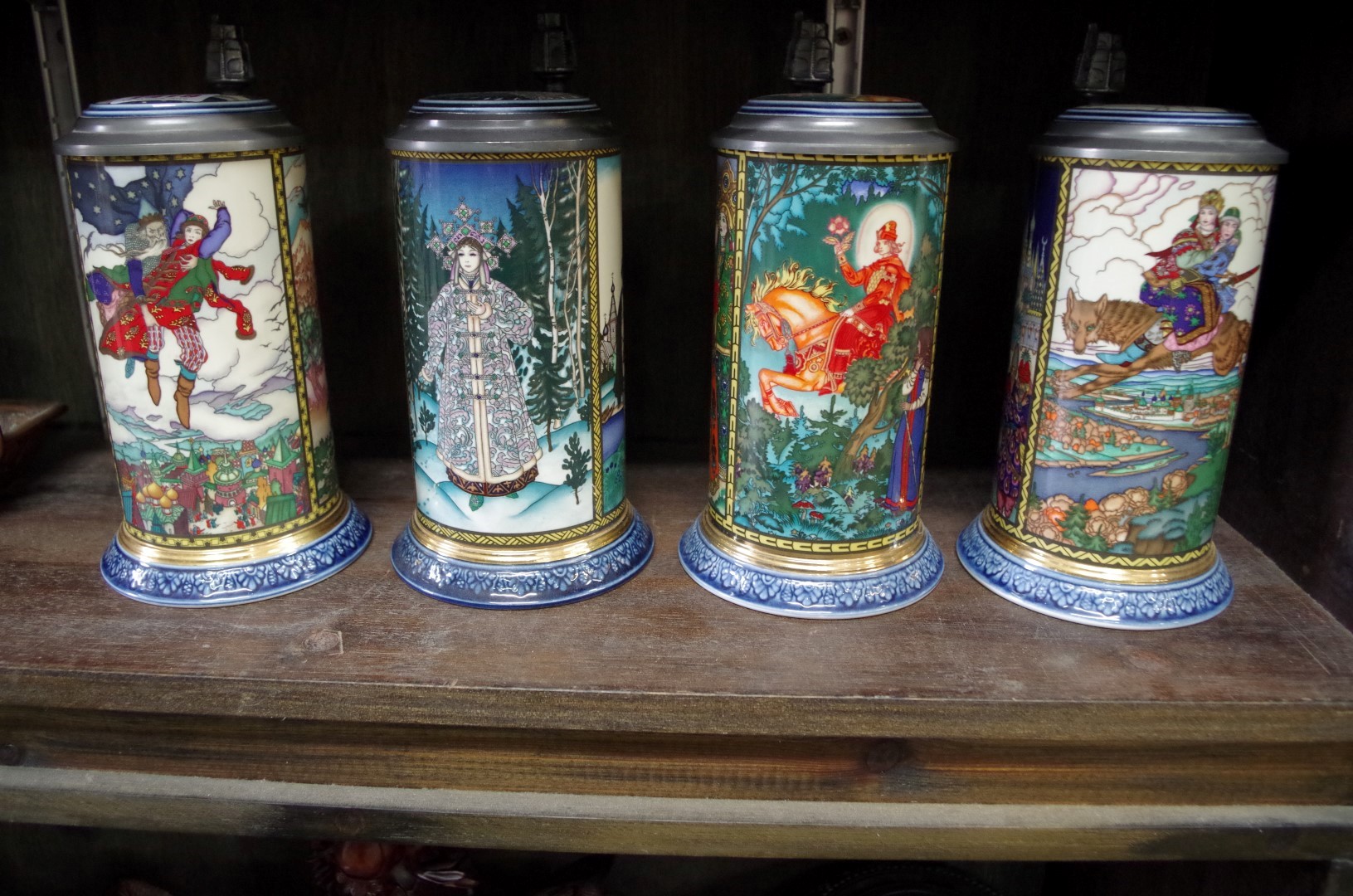 A set of four Villeroy & Boch 'Russian Fairytales', steins, 20.5cm high.