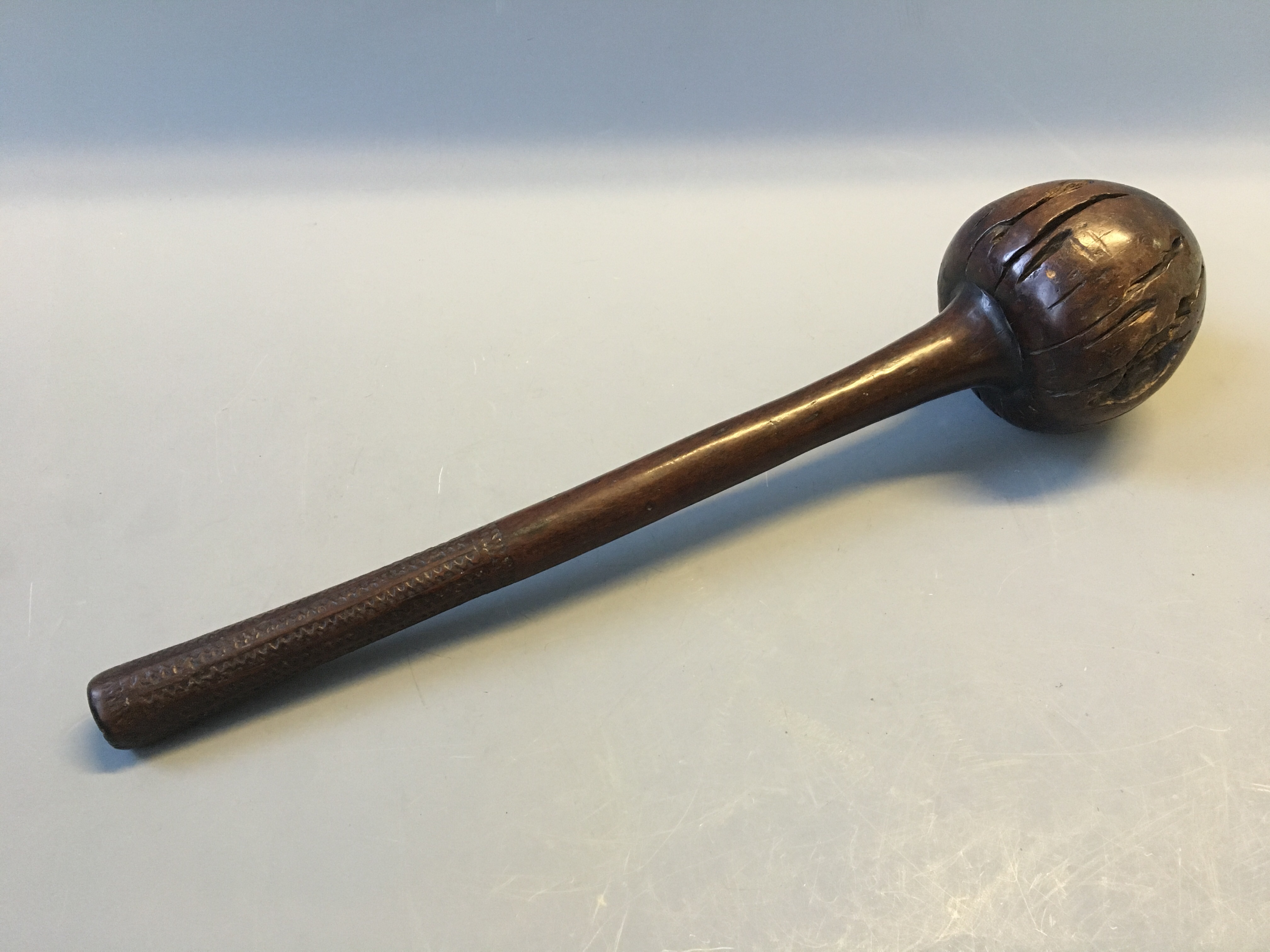 An African tribal knobkerrie club with zigzag carving to handle. Length ...