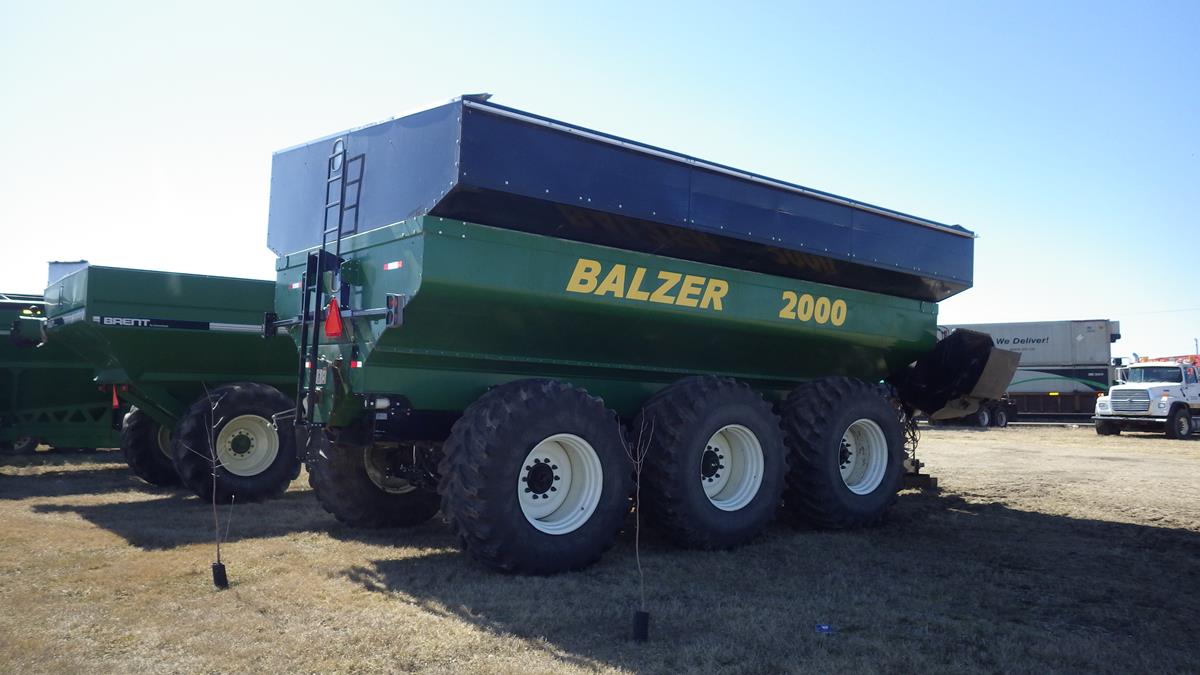 Balzer triple axle grain cart with approx 24 inch discharge auger tires ...