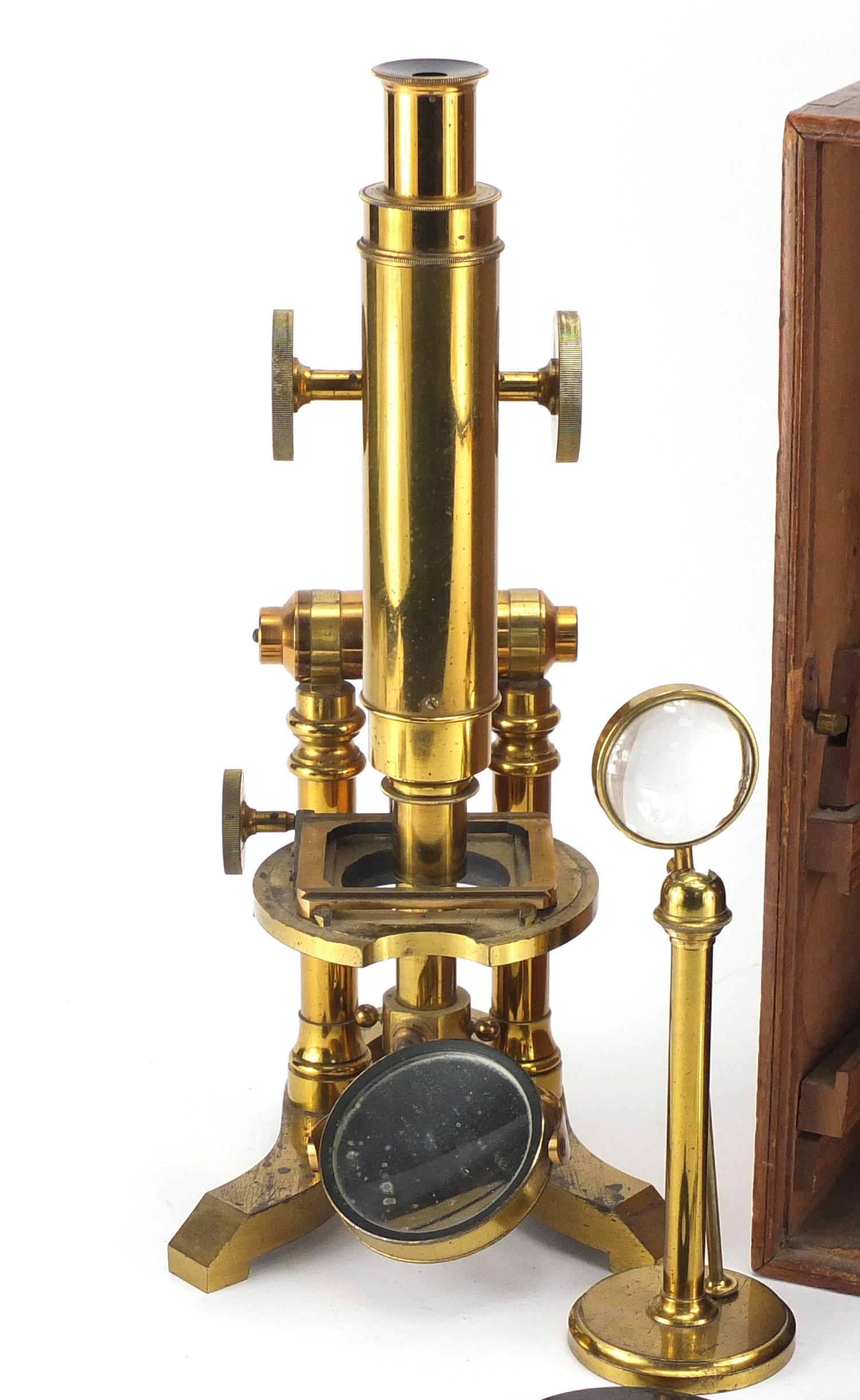 19th century brass microscope by Ross of London, numbered 5219 with ...