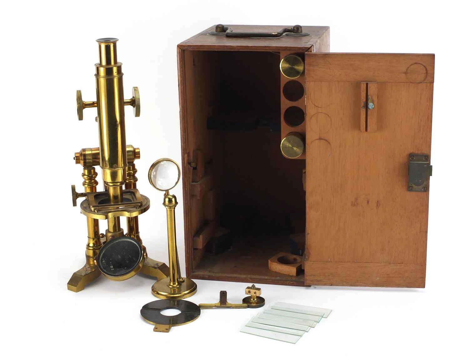 19th century brass microscope by Ross of London, numbered 5219 with ...