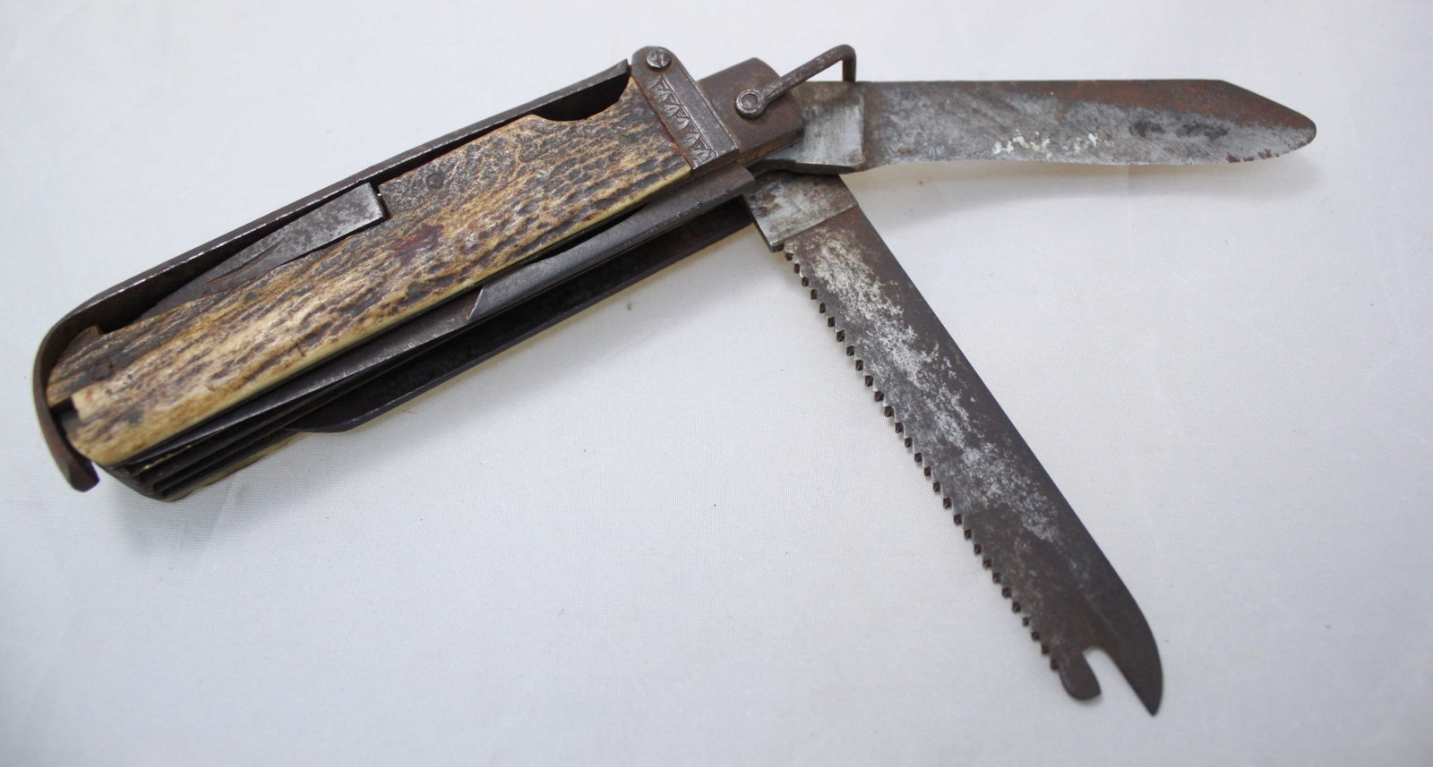 A 19th century coachman's folding pocket knife with eight implements ...
