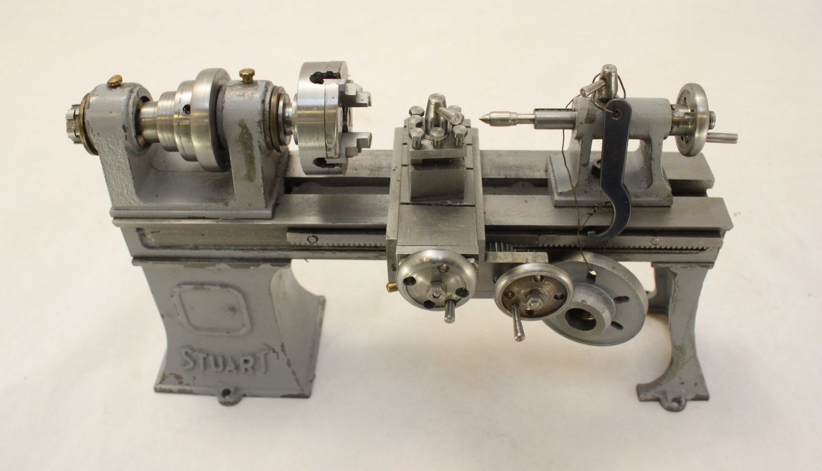 A Stuart scale model engineers lathe, finished in grey, 21cm wide ...