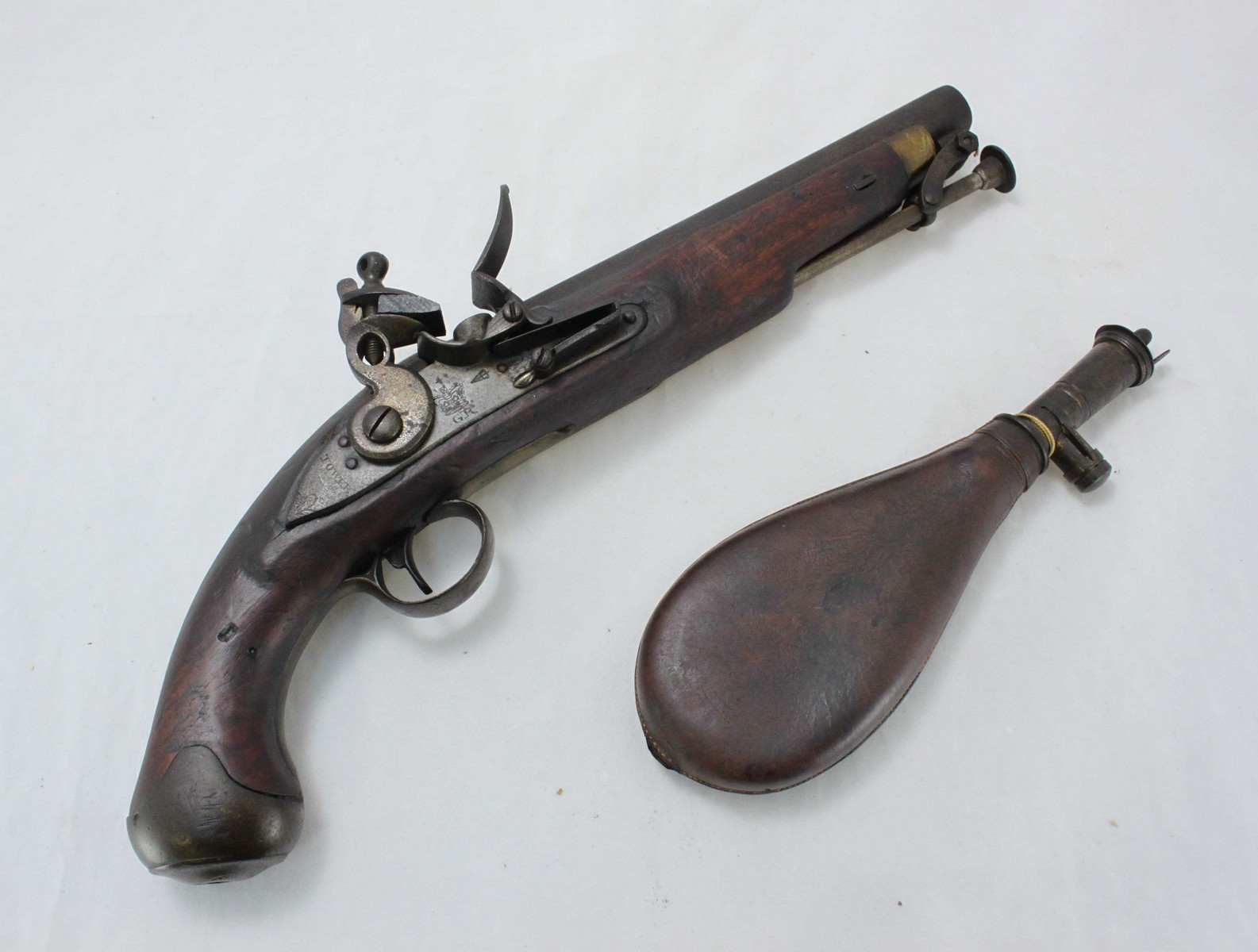 An early 19th century 'Tower' flintlock pistol, with hinged ramrod ...