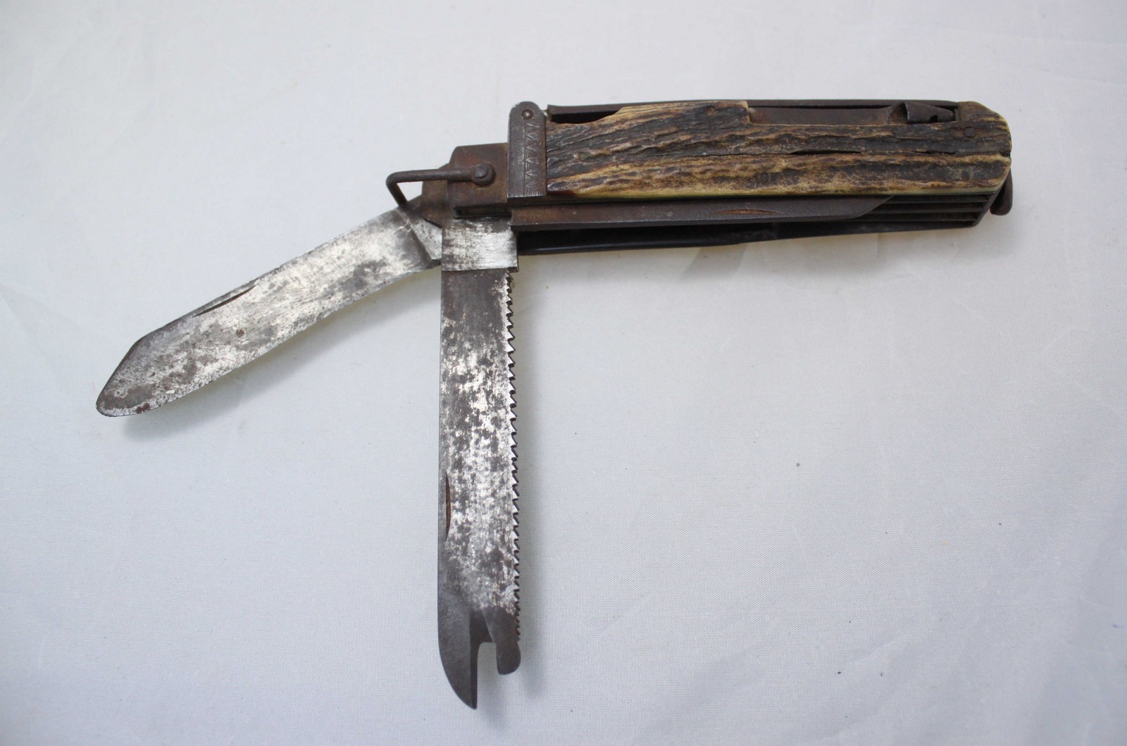 A 19th century coachman's folding pocket knife with eight implements ...