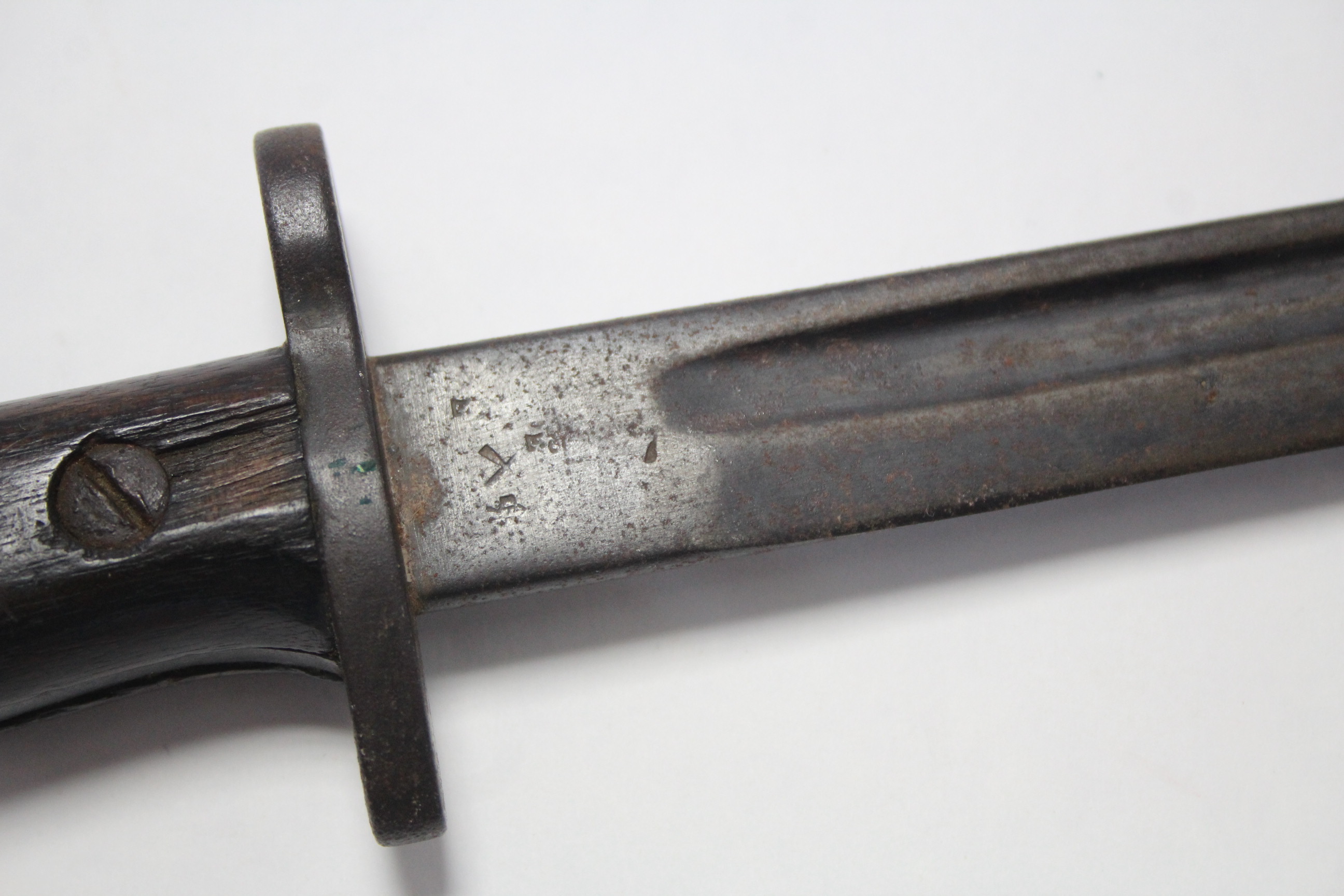 A rifle bayonet with 17” long single-edge curved blade & with hardwood ...