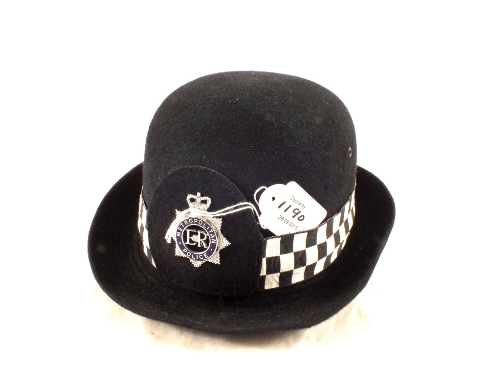 A North Yorkshire traffic Police cap (white top) with a female Police ...