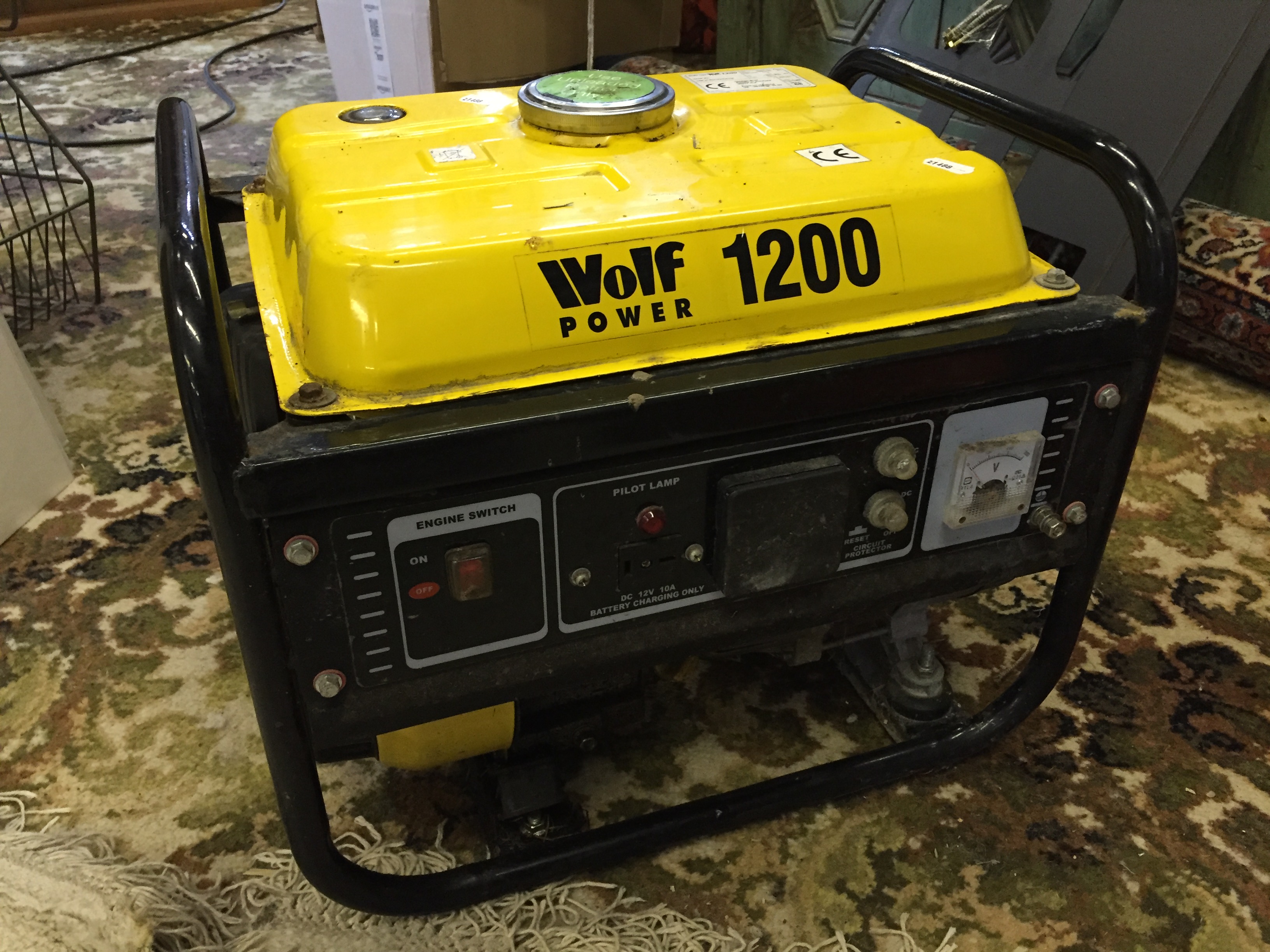 A diesel 3 Horse power 4 stroke engine Wolf Power 1200 generator.