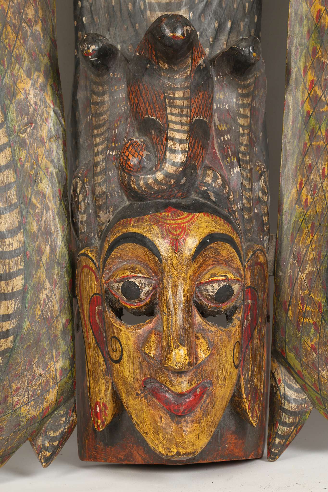 A 'RAKSHA' DEMON MASK, SRI LANKA Possibly representing Naga Kanya ...