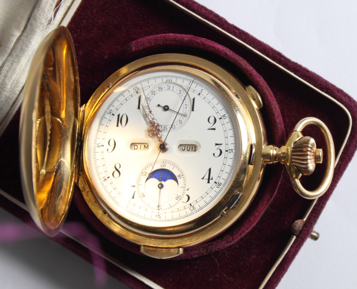 An 18ct gold full hunter moon phase repeater pocket watch, the white ...
