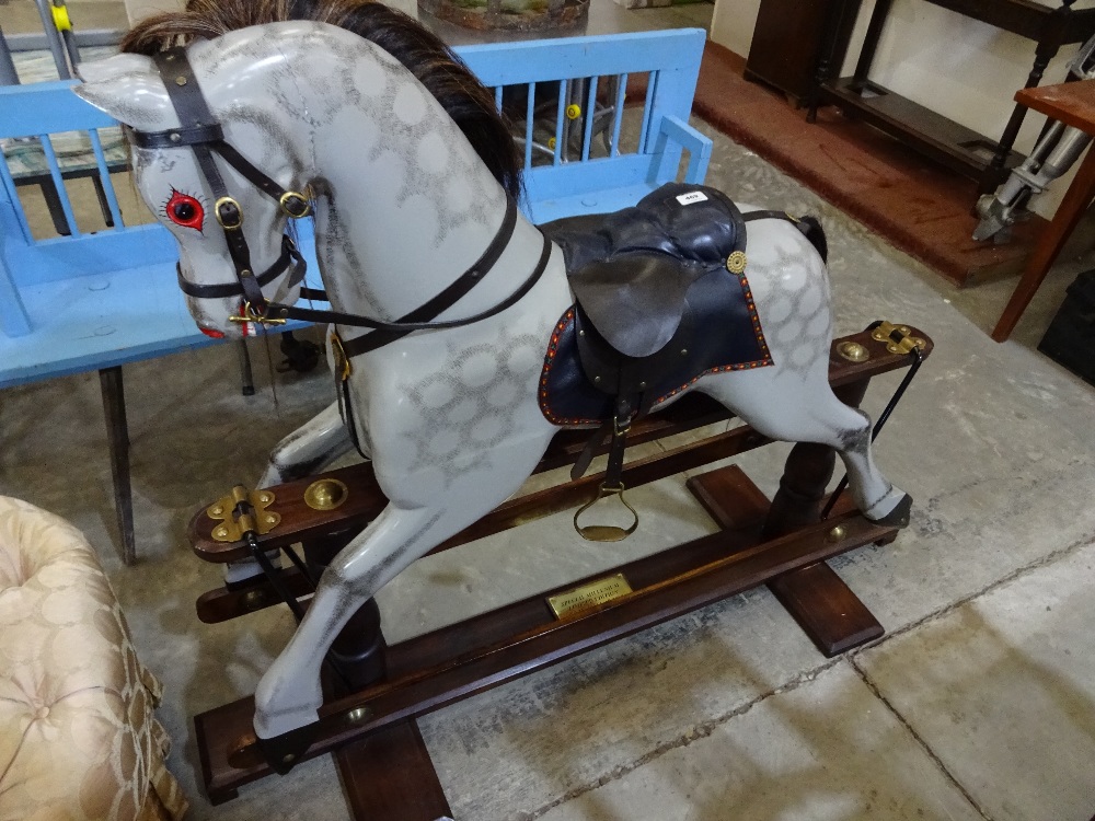 A modern rocking horse on stand with plaque, Special Millennium Limited ...