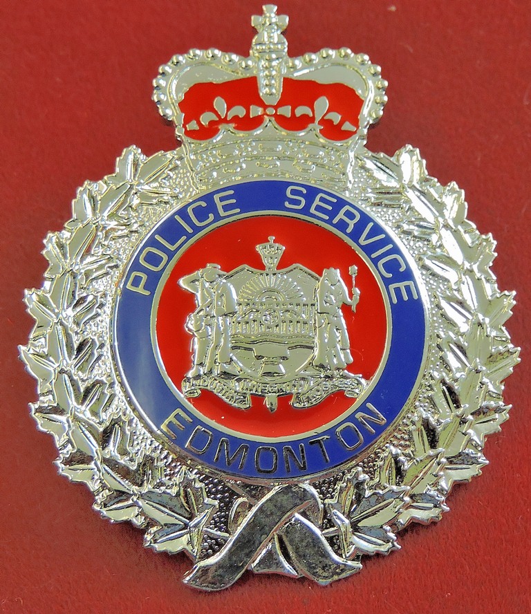 Edmonton Police Service cap badge, white metal with enamel facings ...