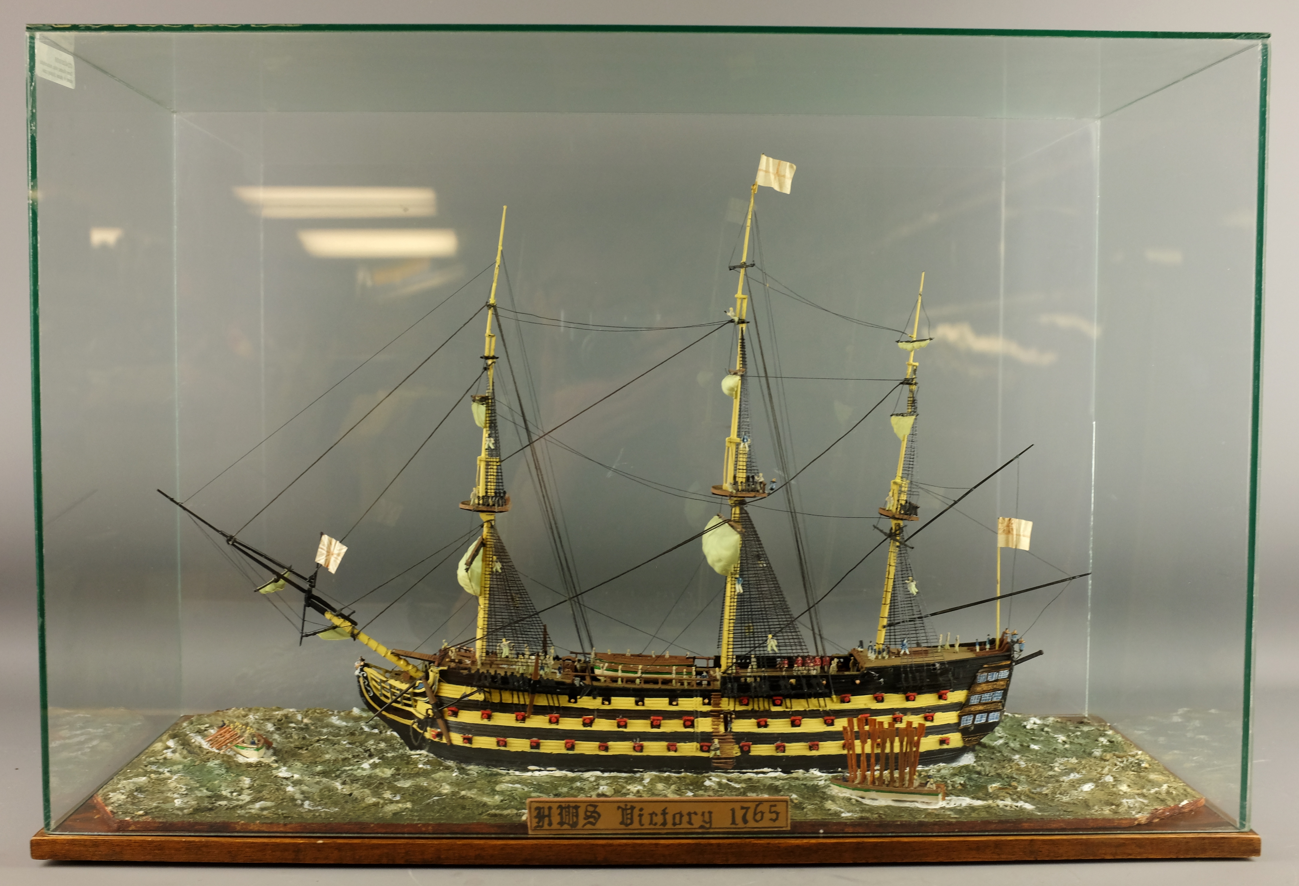Diorama of HMS Victory, waterline rigged model with two tenders in ...