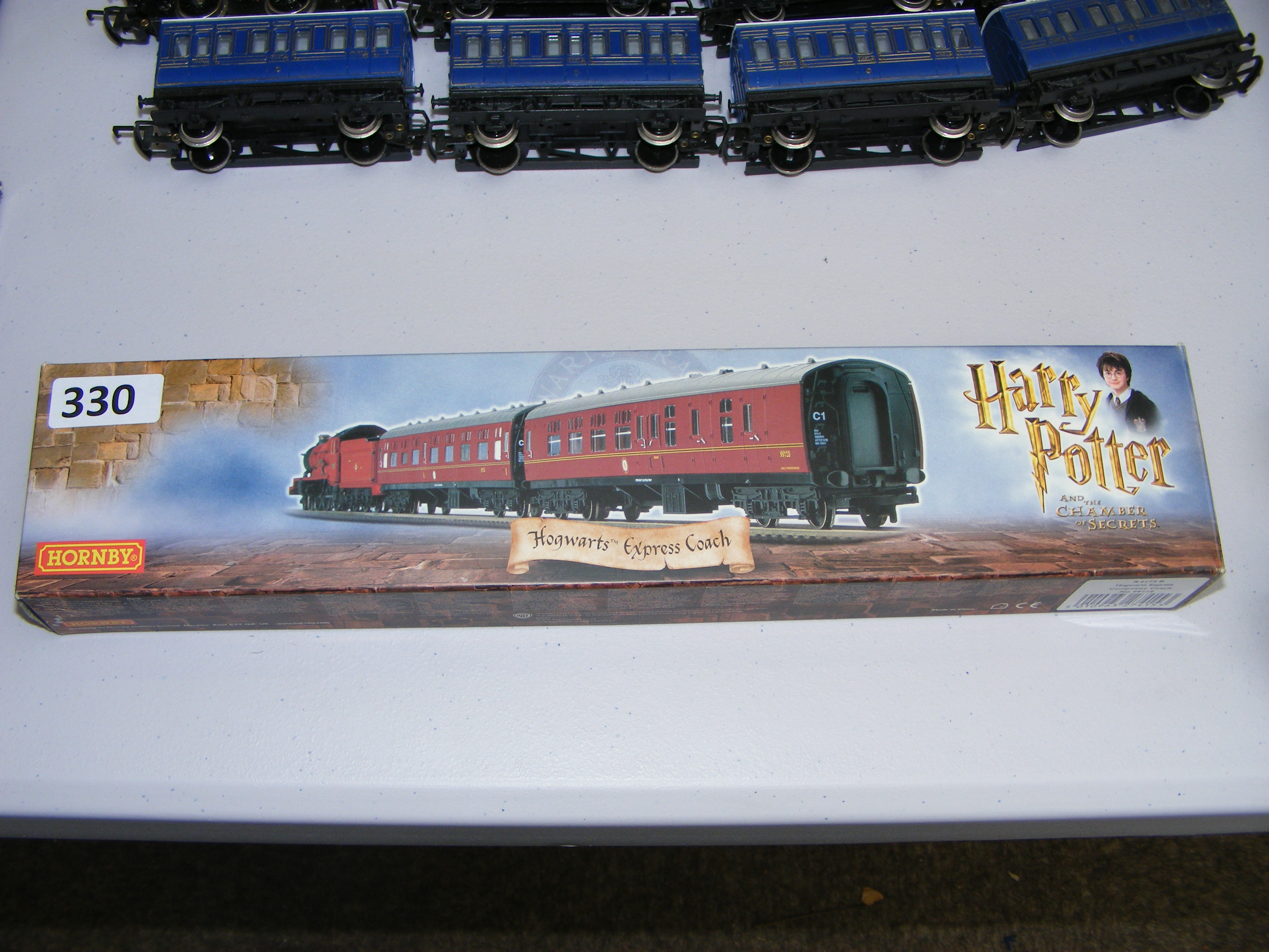 A boxed Harry Potter COS Hornby Hogwarts Express Coach R4175B.