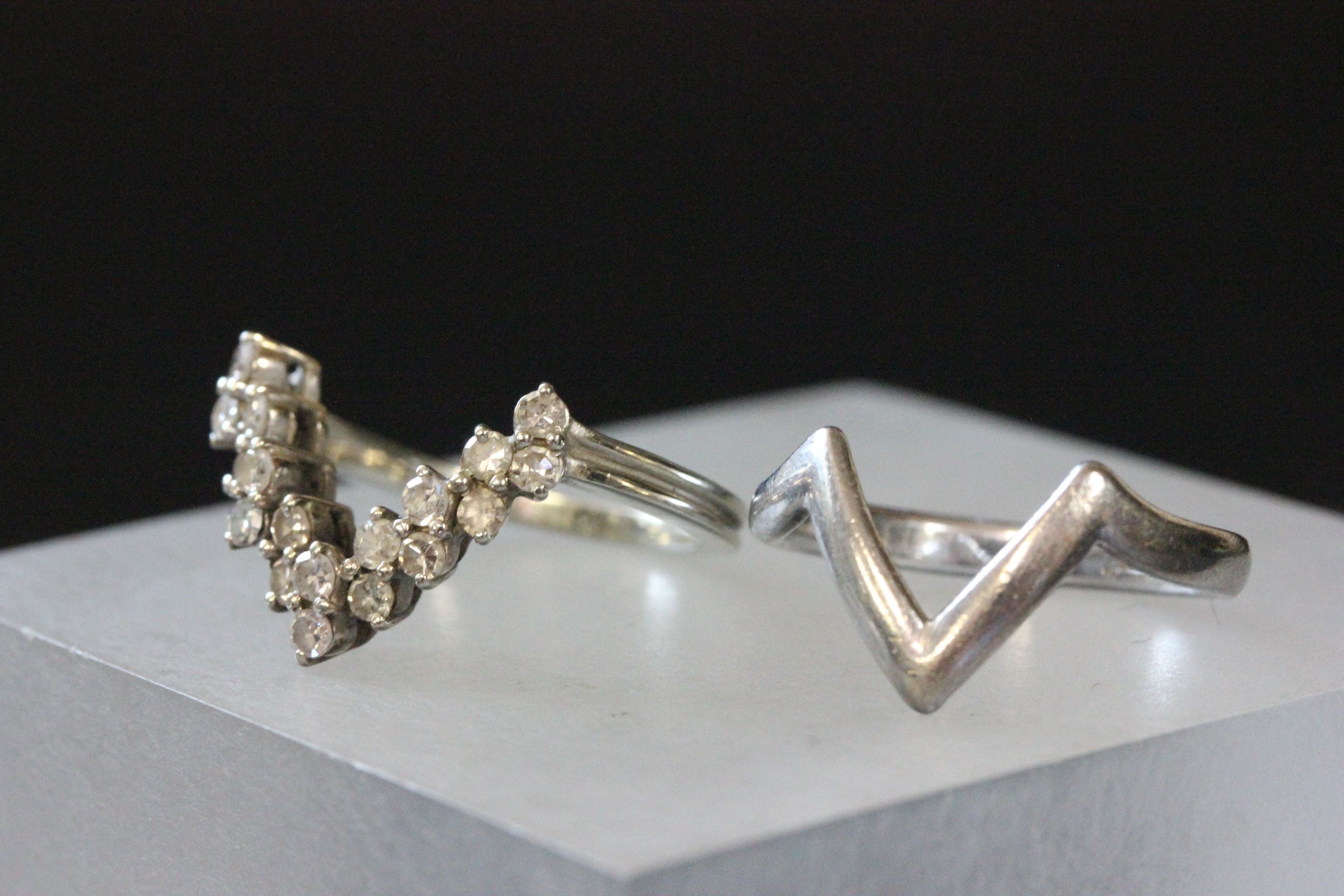 Pair of 18ct gold wishbone rings one set with diamonds