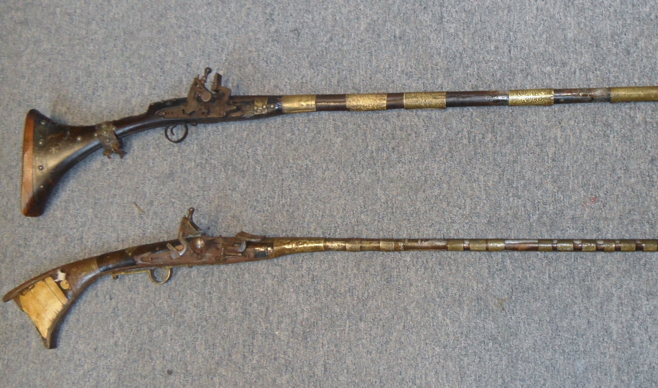 TWO MOROCCAN SNAPHAUNCE GUNS, 19TH CENTURY the first with swamped ...