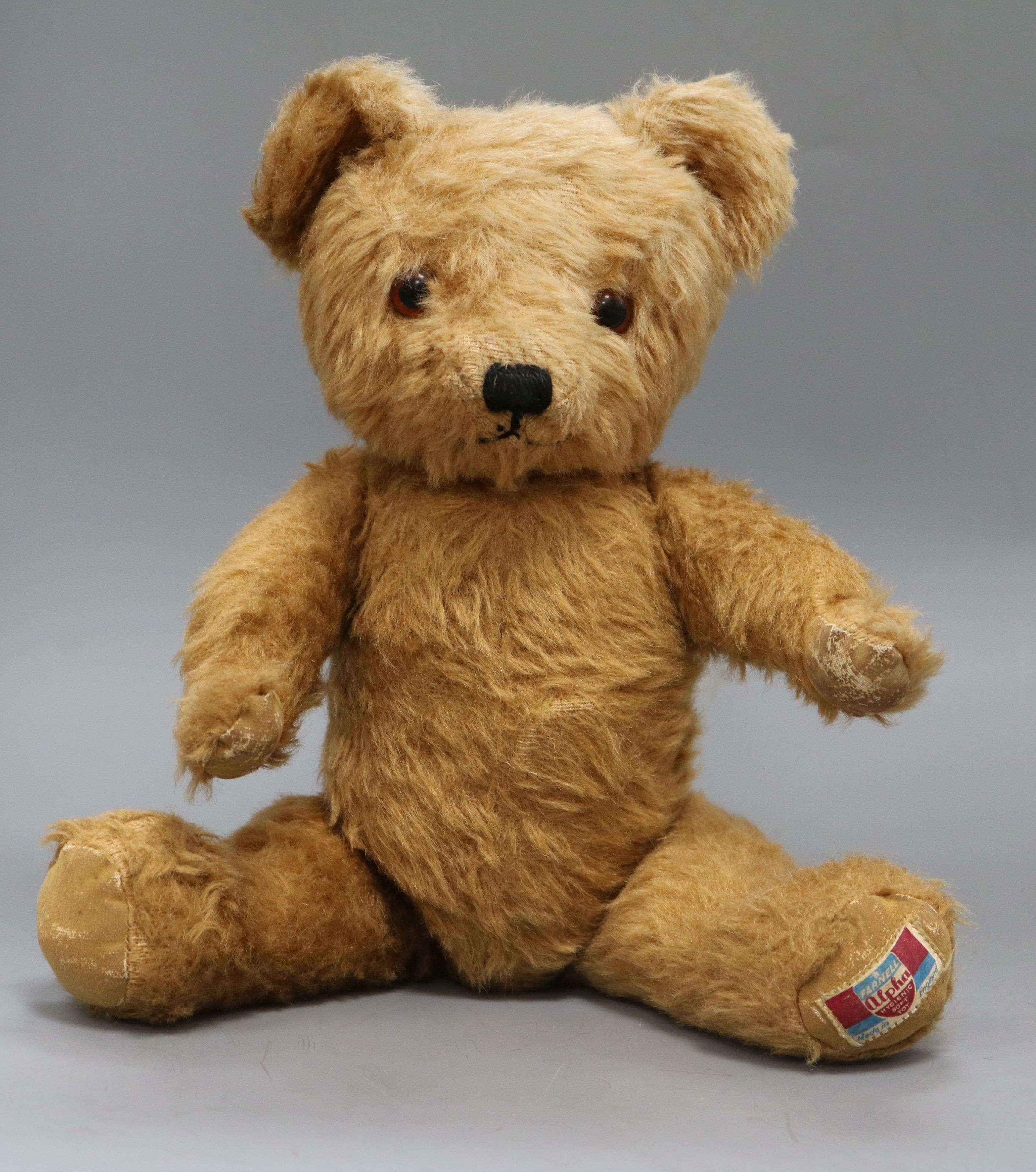 A 1950's Alpha Farnell teddy bear, Emma, with golden brown mohair, deep ...
