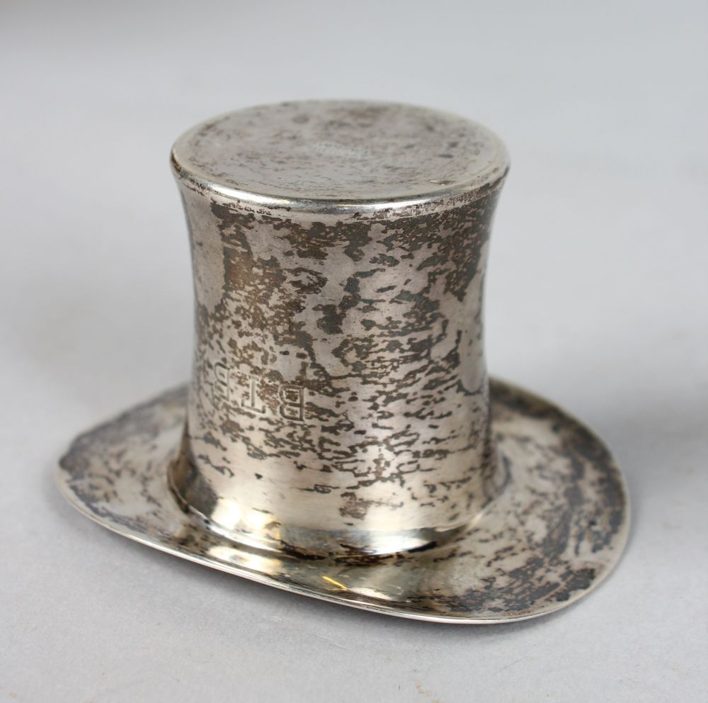 A CARTIER SILVER TOP HAT. 2ins high.