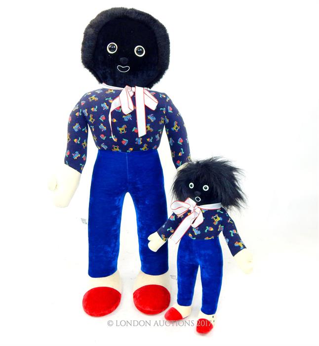 A large soft toy "Merrythought" Golly (98cm high) together with another ...