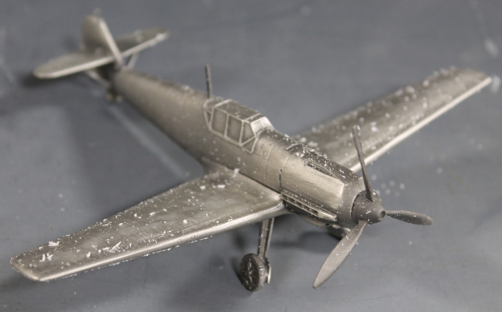 A SET OF TWELVE PEWTER SCALE MODELS OF 'THE GREAT FIGHTER AIRCRAFT OF ...
