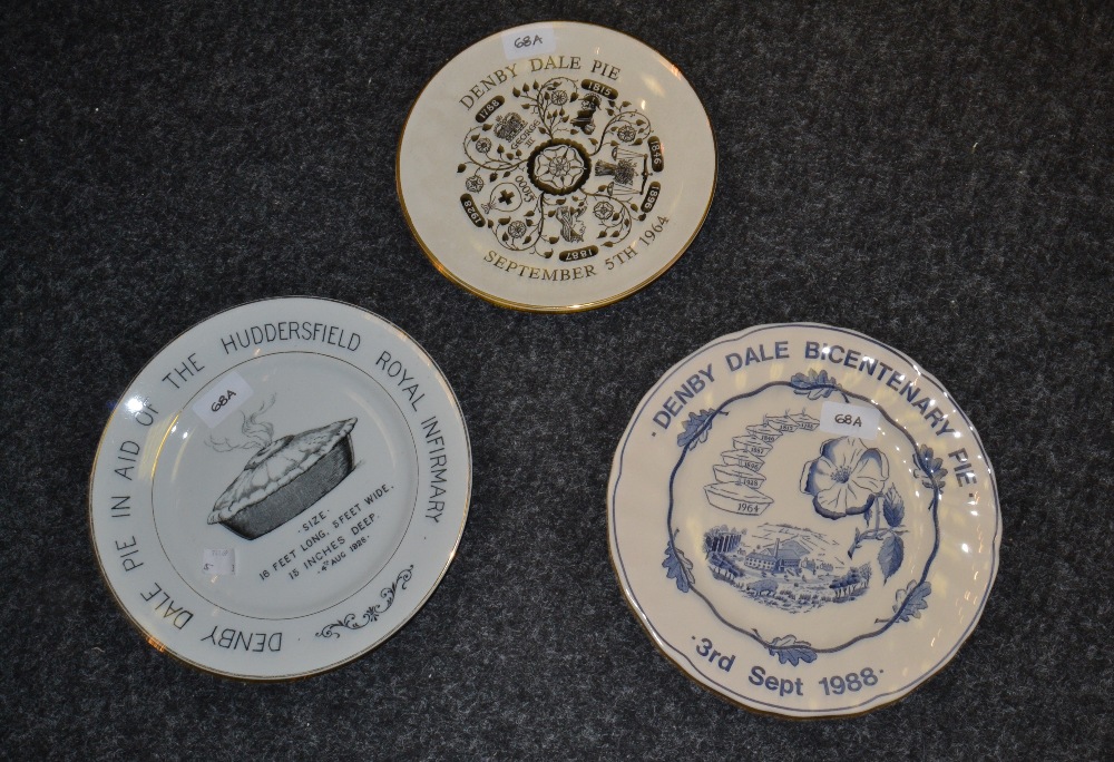 A Denby Dale pie plate, 1928; others, 1964 and 1988