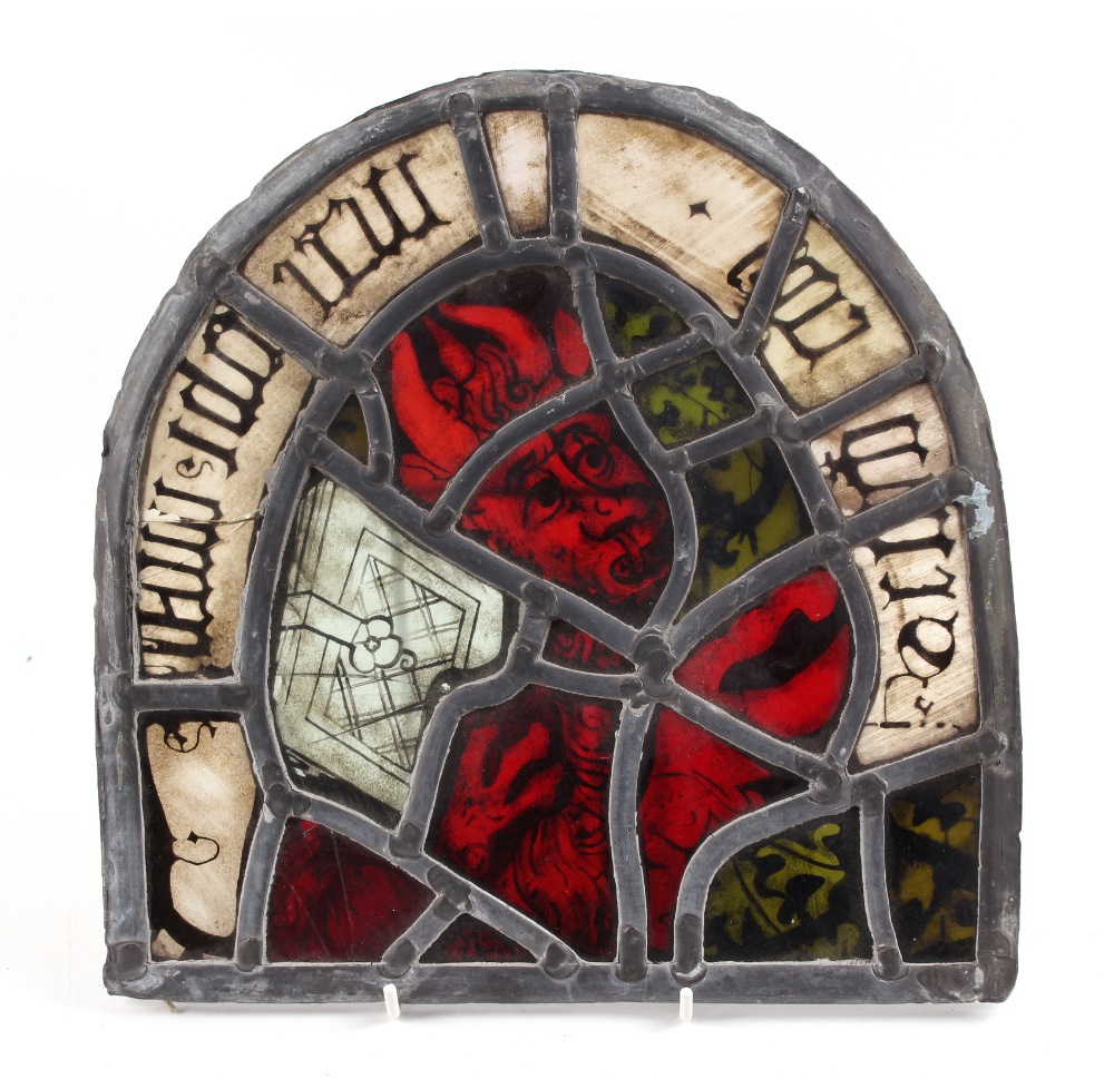An antique stained glass panel depicting Satan or the Devil, 10.5ins ...