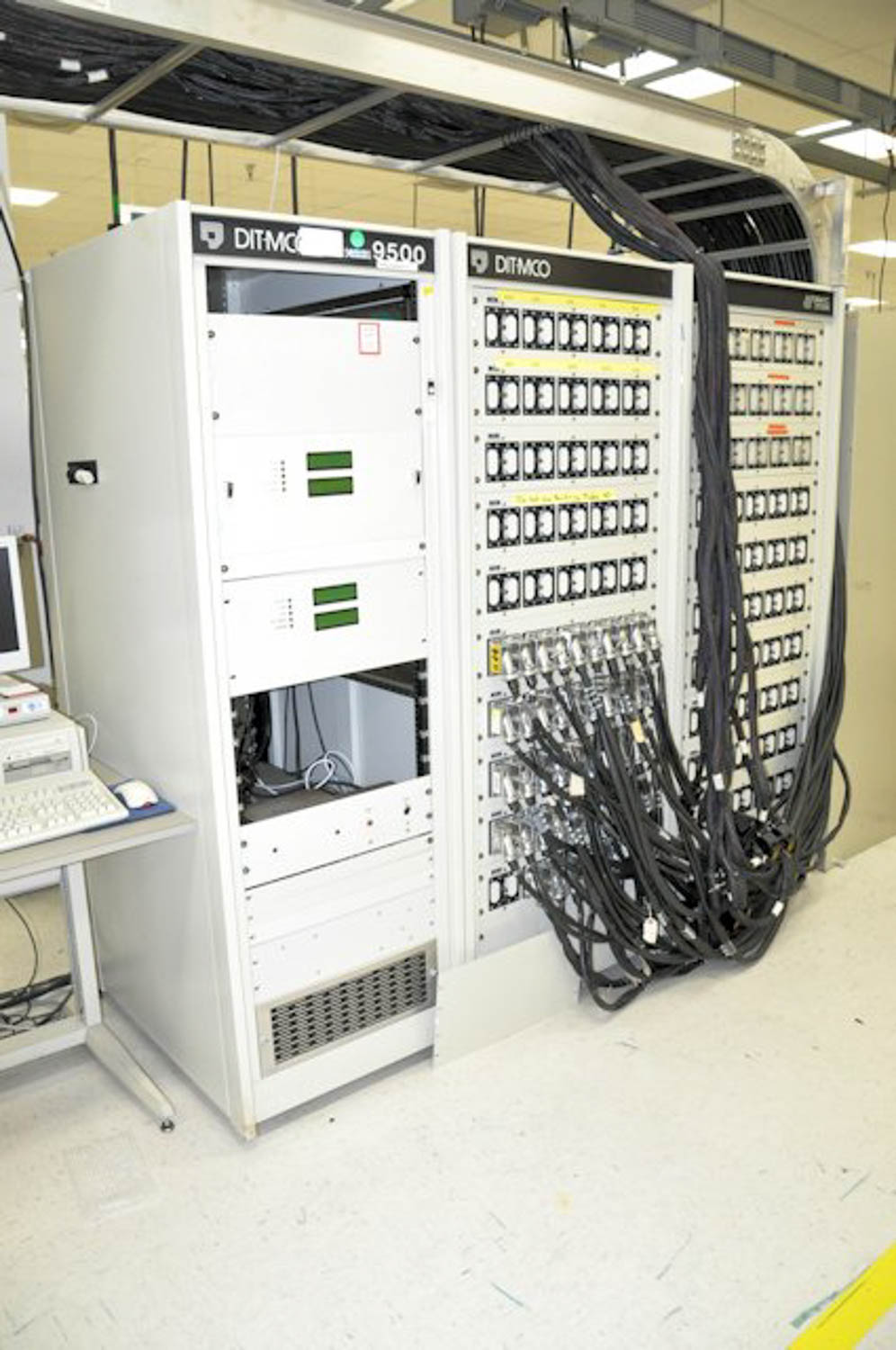 DIT-MCO MODEL 9500 AUTOMATIC TEST STATION WITH WIRE TRACK