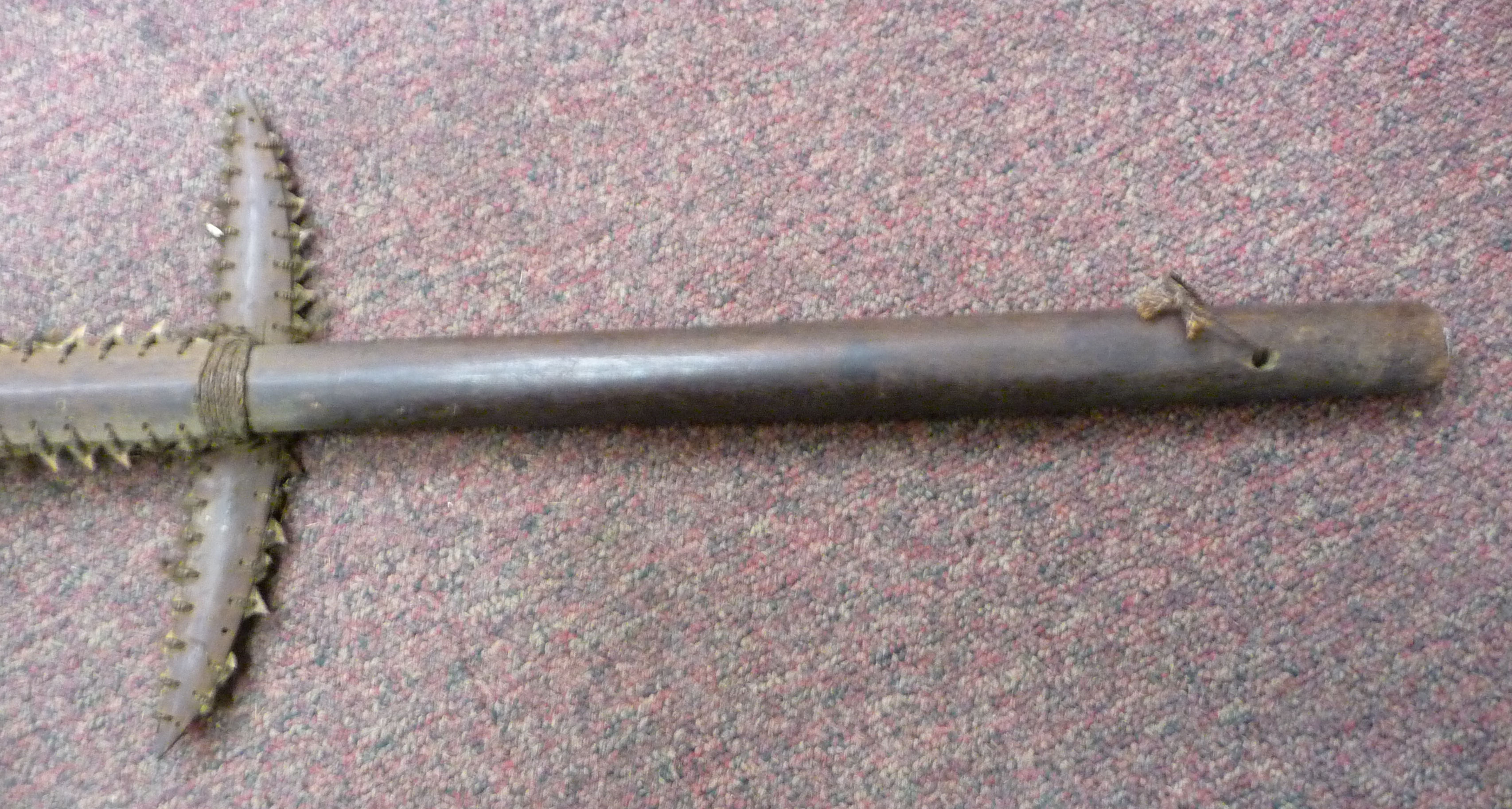 A Pacific Islands native, hand held wooden sword-like weapon, set with ...