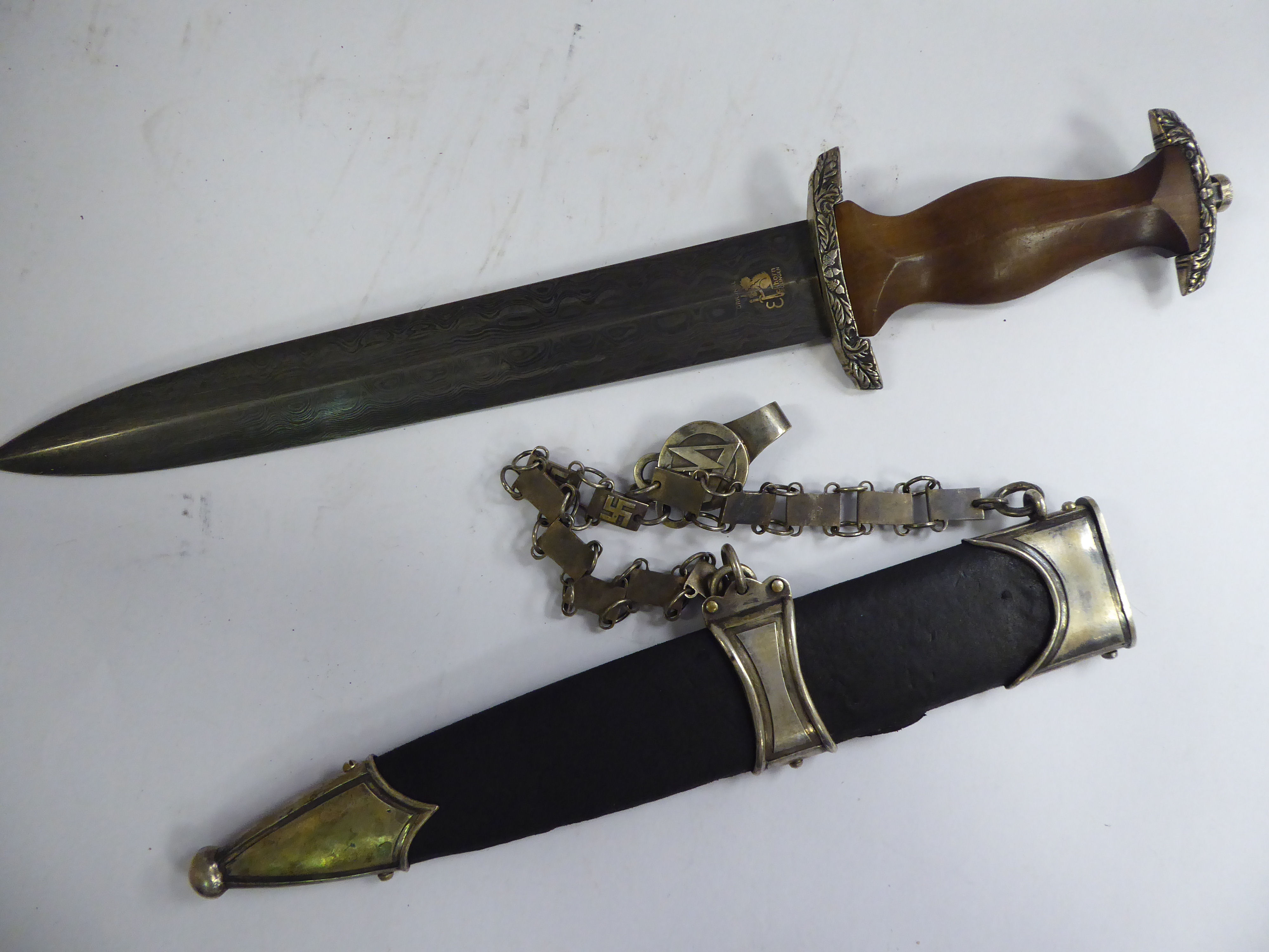 A replica of a Nazi SA Leaders dagger the blade 9.25"L in a sheath with ...