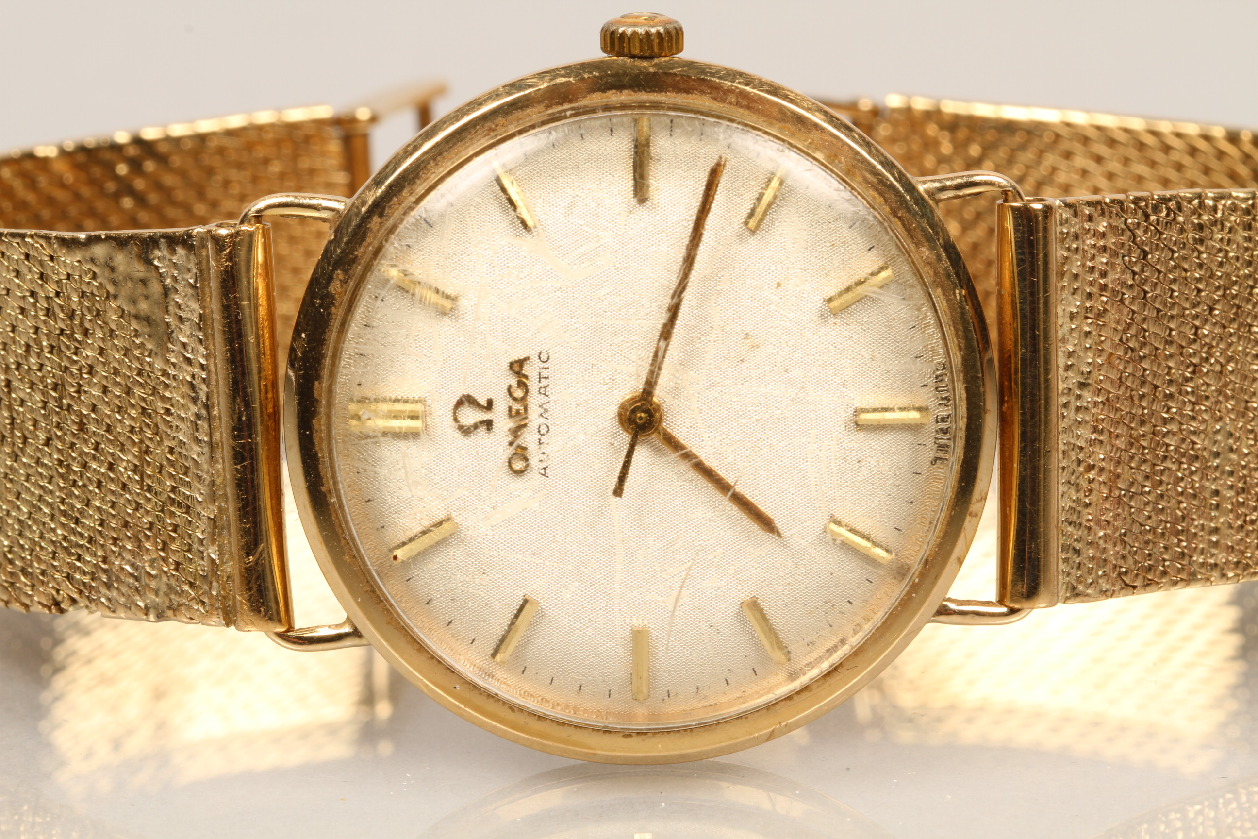 Gents 9 carat gold Omega automatic wrist watch, with a 9 carat gold ...