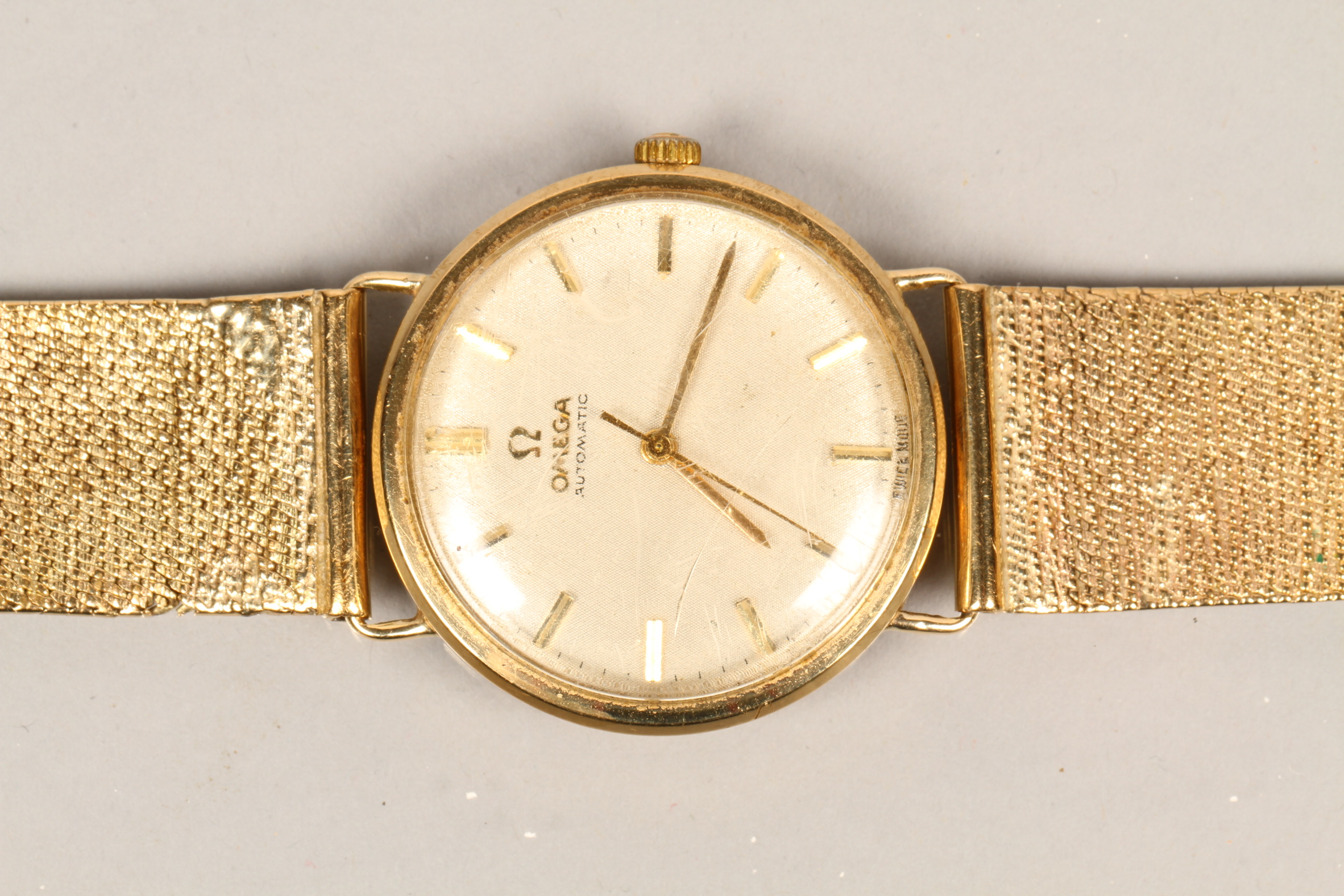 Gents 9 carat gold Omega automatic wrist watch, with a 9 carat gold ...