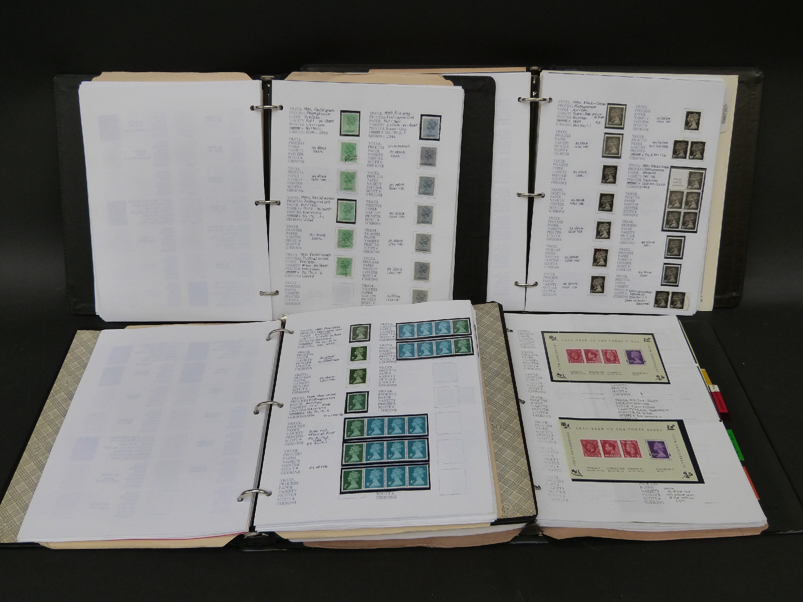 An extensive collection of Machin stamps in four albums