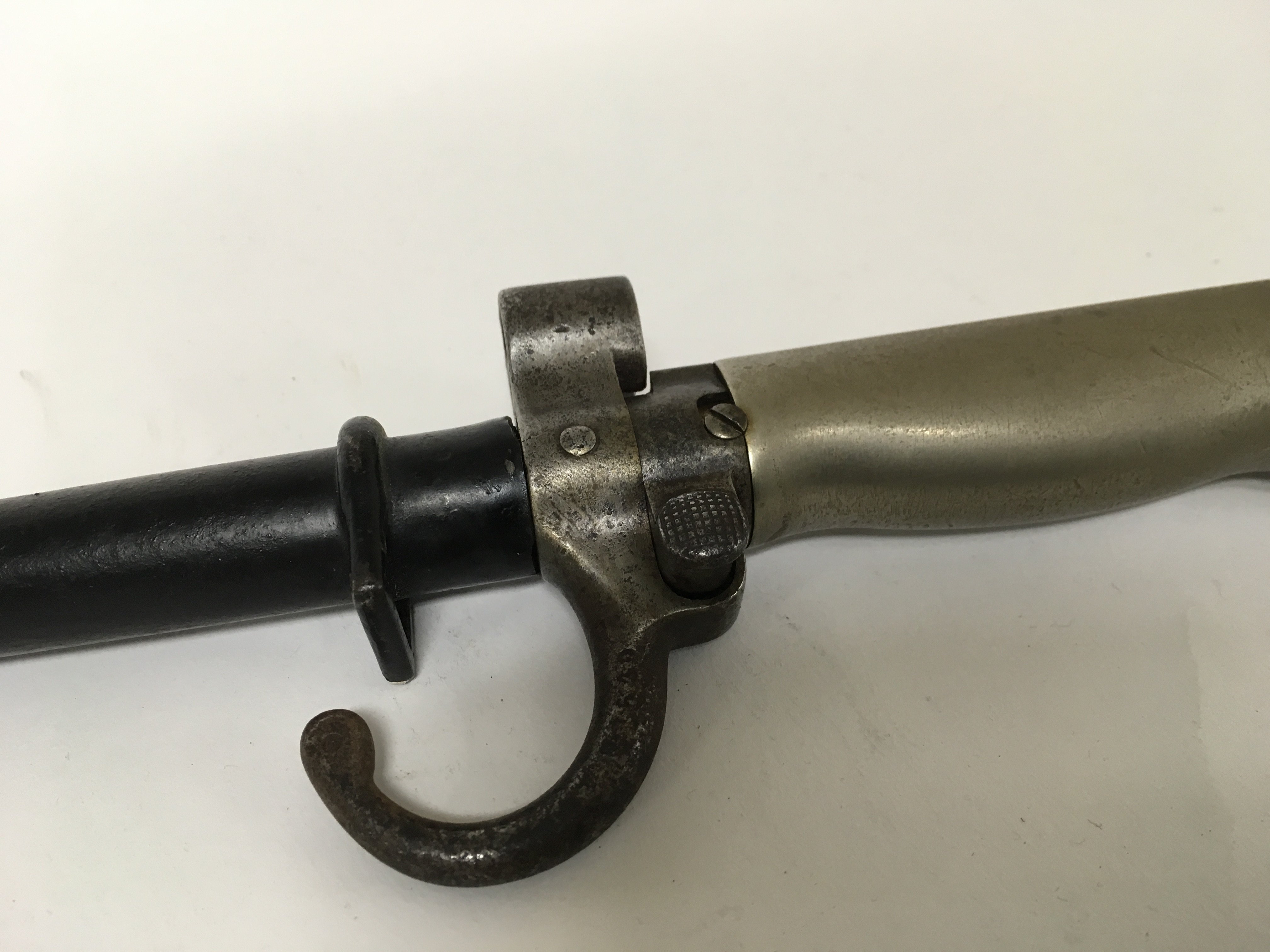 A French M1886 bayonet for use with the 8mm Lebel rifle. This bayonet ...
