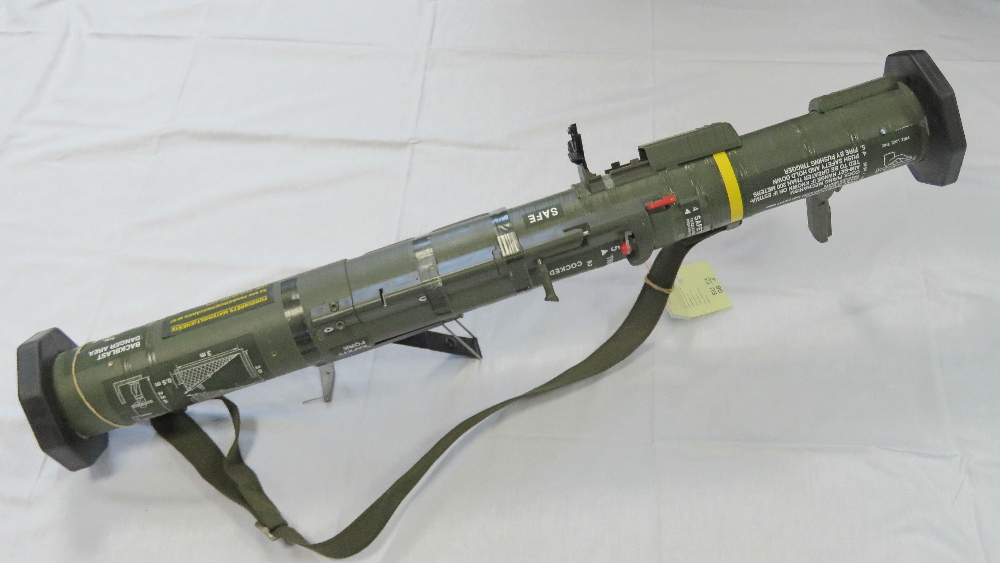 A deactivated British military AT4 rocket launcher with certificate.