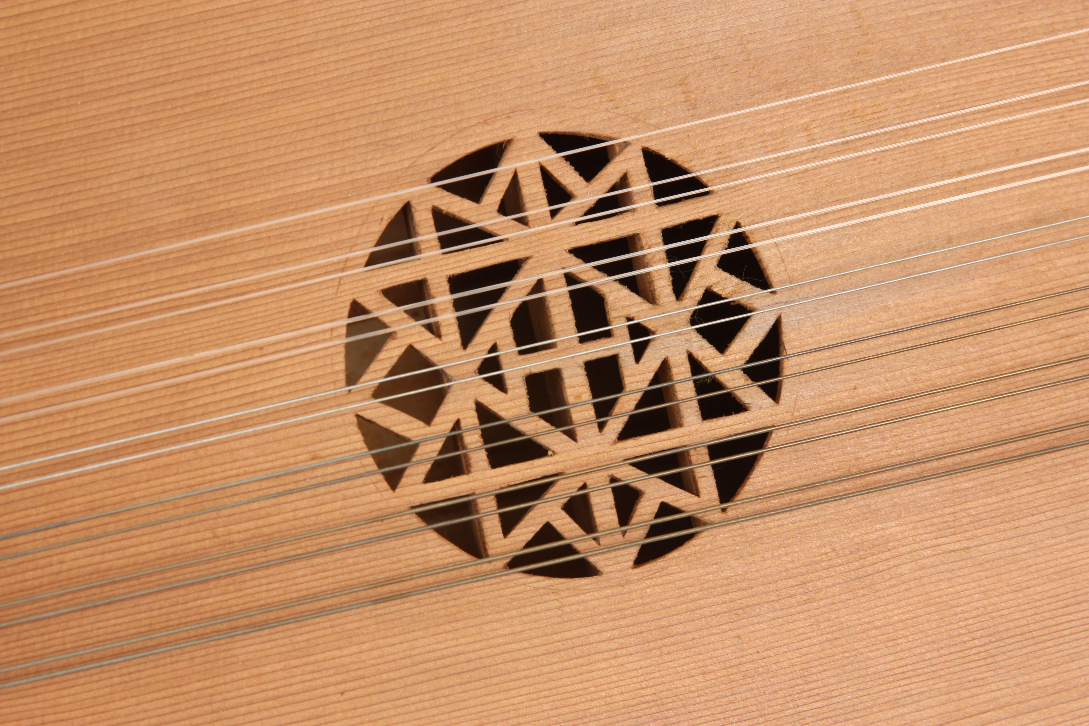 AN MID 20th CENTURY ENGLISH LUTE with pierced sound fret and segmented ...