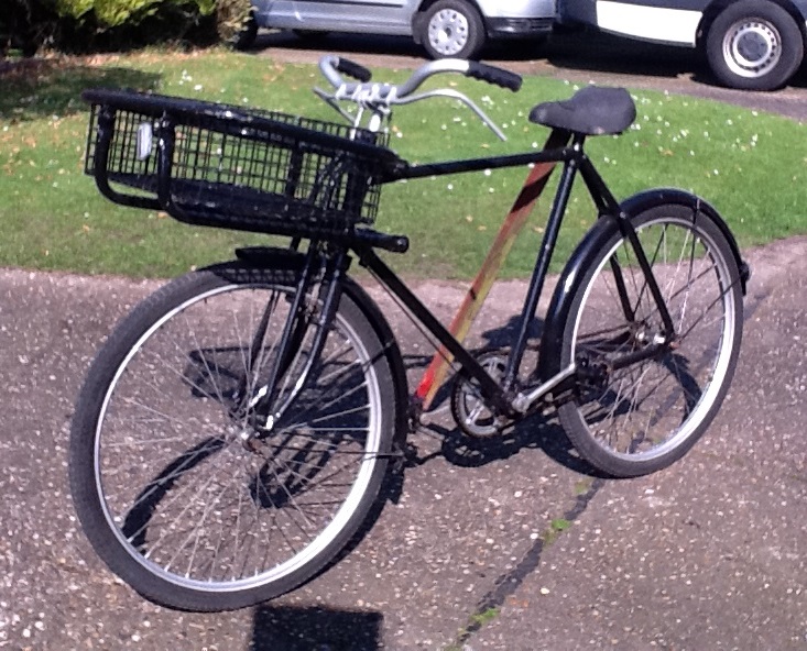 A vintage delivery push bike, of unknown manufacture, with rod brakes ...