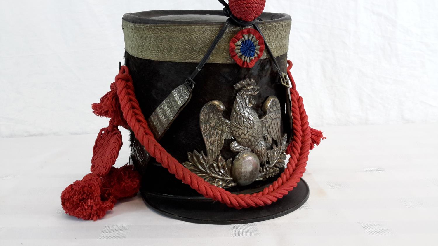 Napoleonic French military hat with cockerel cap badge, red tassels ...
