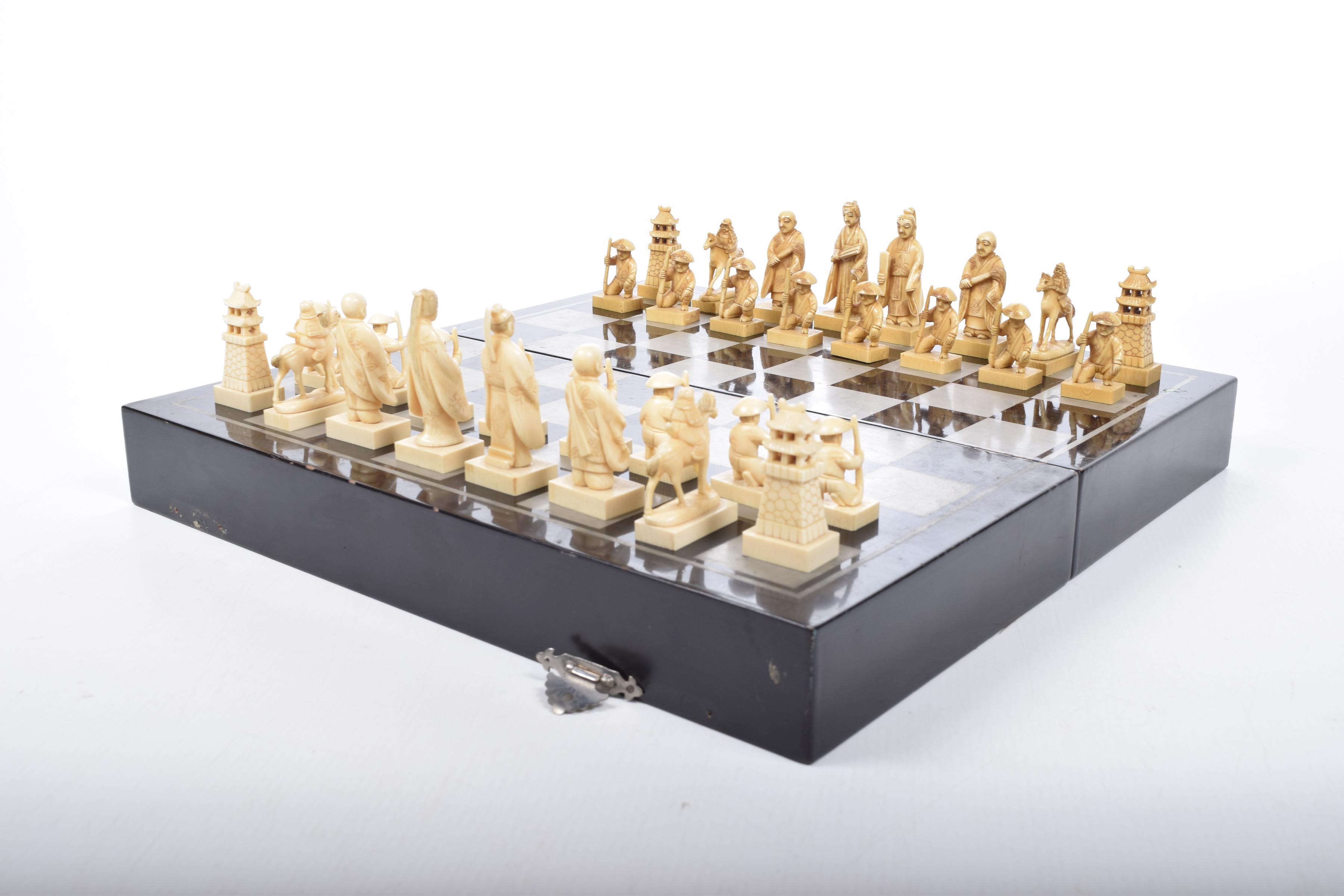 A Japanese carved ivory chess set, Circa 1936Comprising thirty-two ...