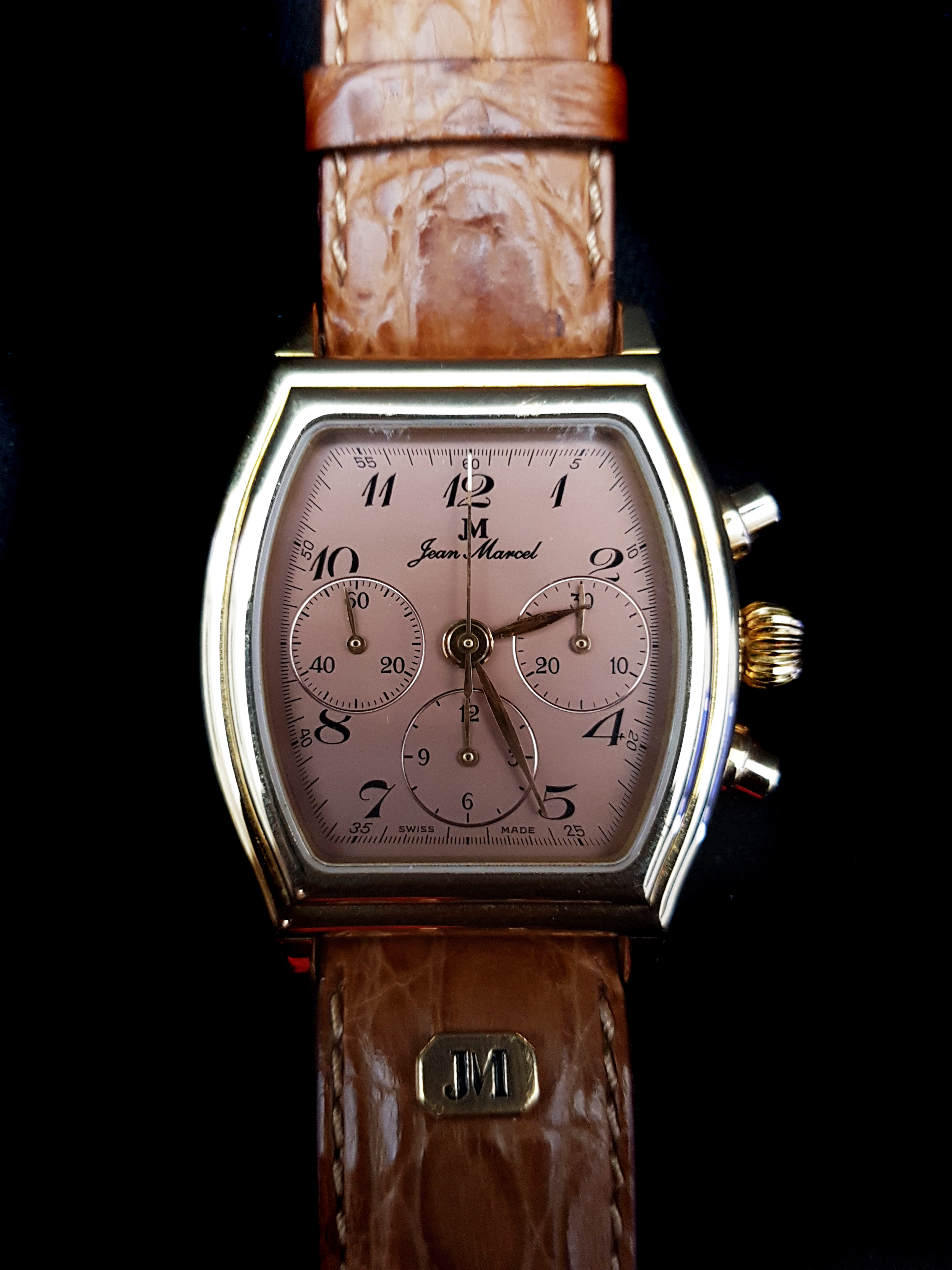 A Jean Marcel 18k gold chronograph wristwatch, rose coloured dial with ...