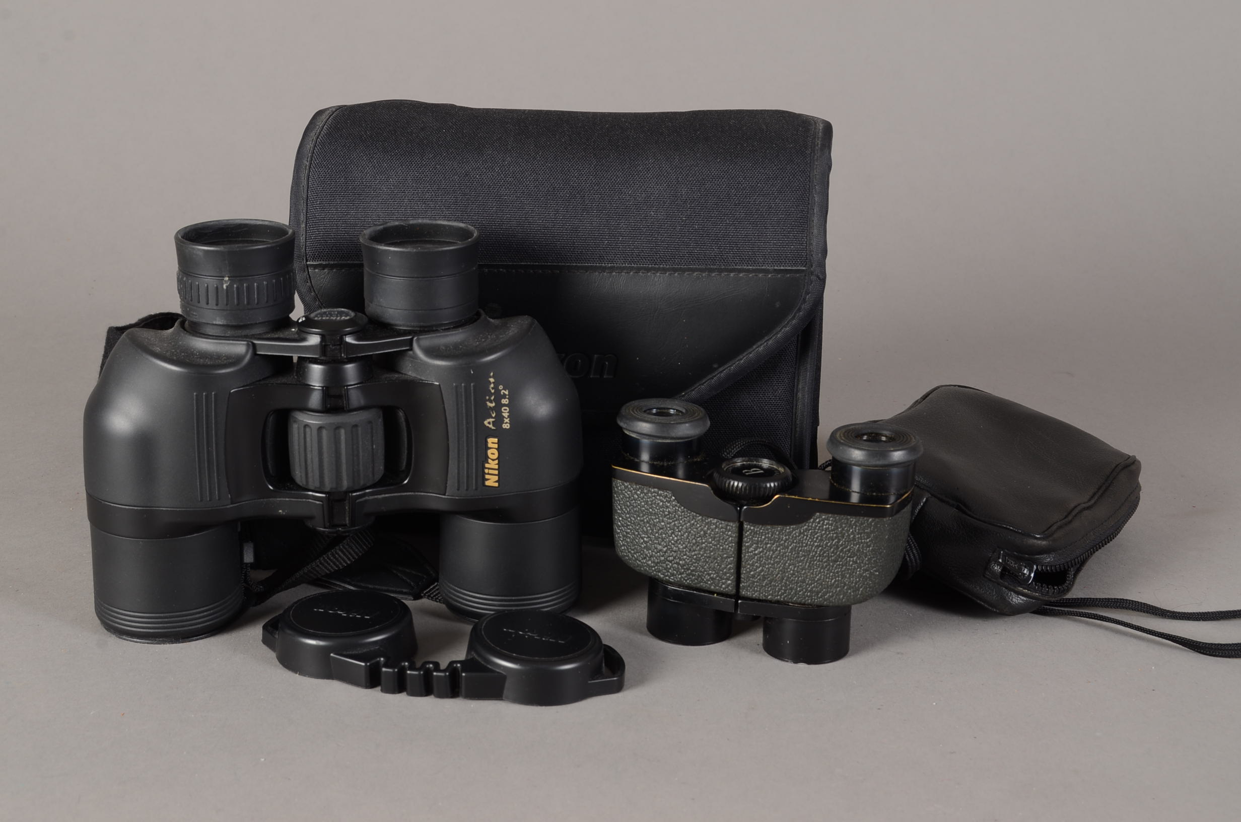 A Pair of Nikon Action 8 x 40 Binoculars, serial no 218153, with maker ...
