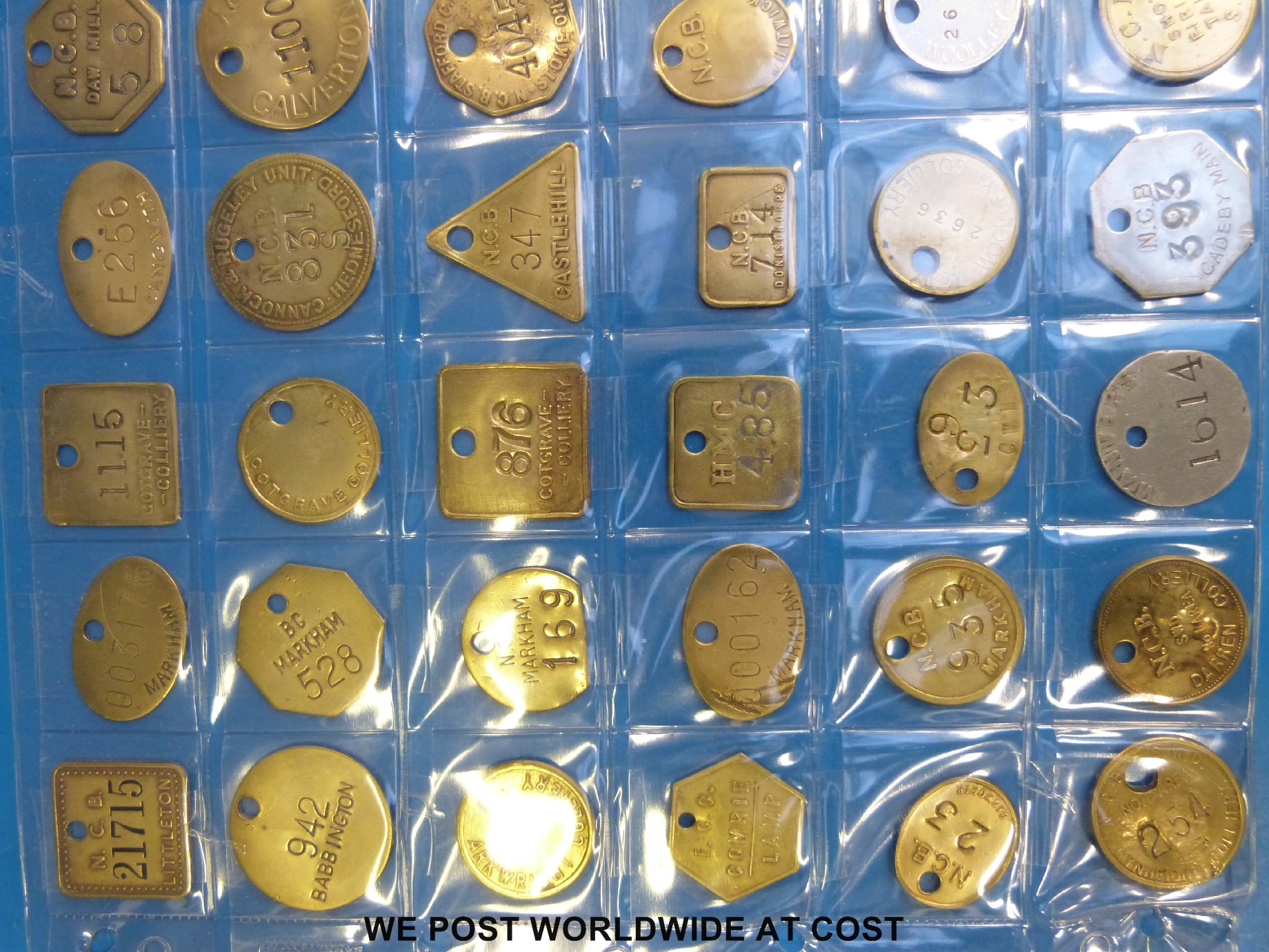 A good collection of 88 coal miners' tokens from Wales, Yorkshire and ...