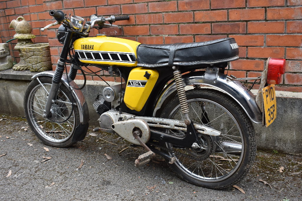 A 1976 Yamaha FS1E DX, registration number PYD 35P, yellow. The FS1E ...