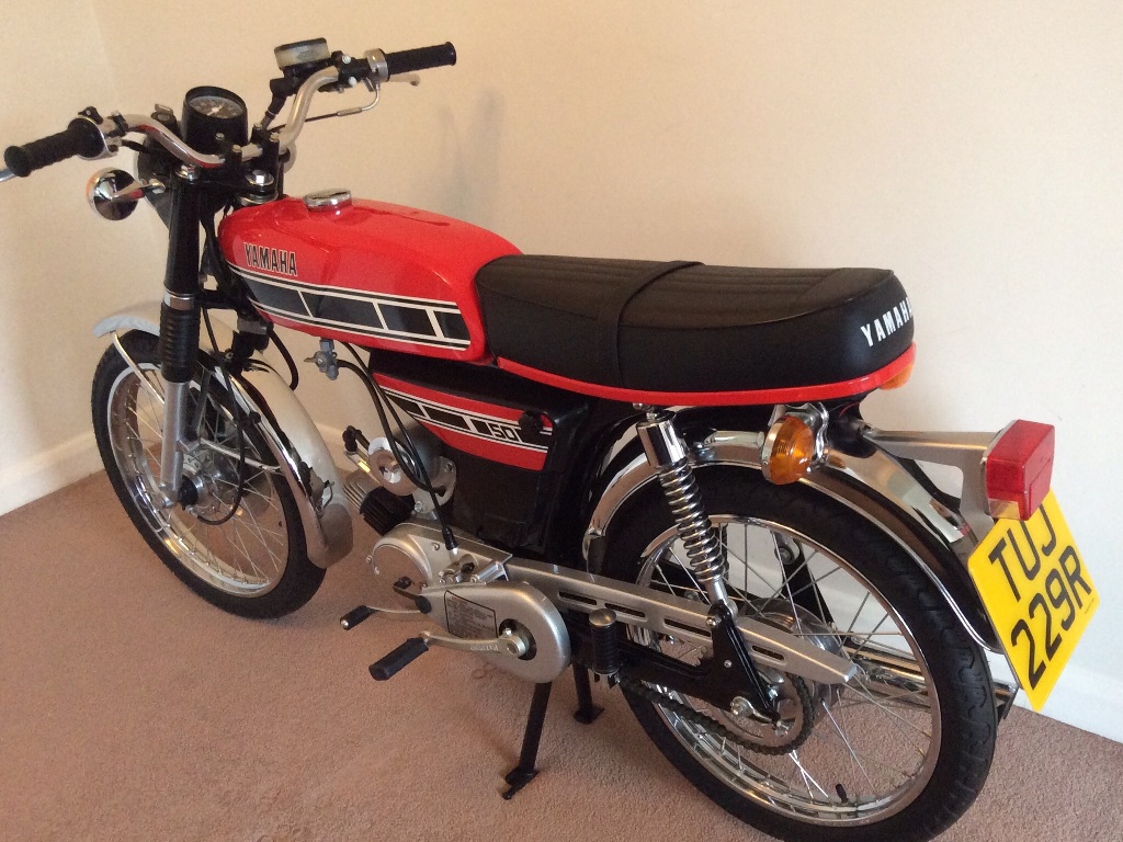 A 1977 Yamaha FS1E-DX, registration number TUJ 229R, red. This FS1E is ...