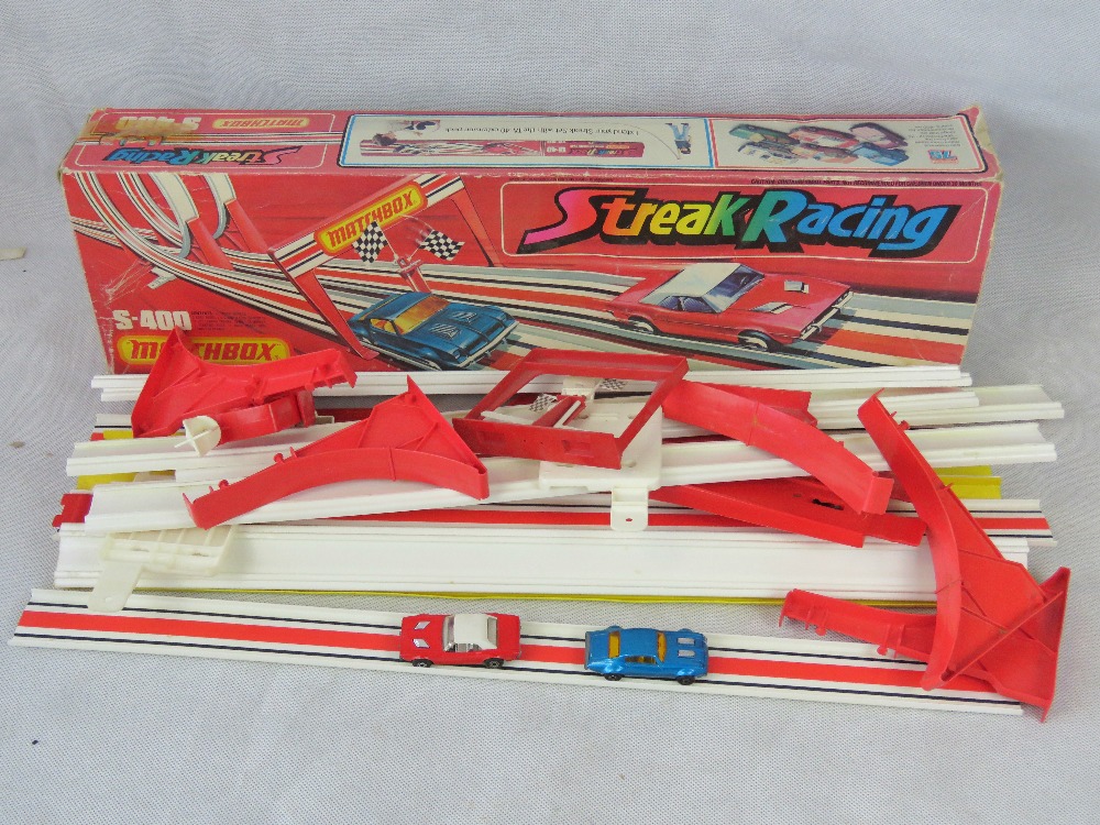 A retro Matchbox S-400 Streak Racing part set; with some track, cars ...