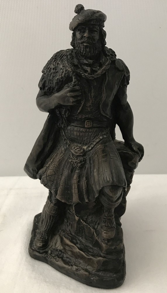 A signed John Letts sculpture of a highlander. Approx. 16cm tall.