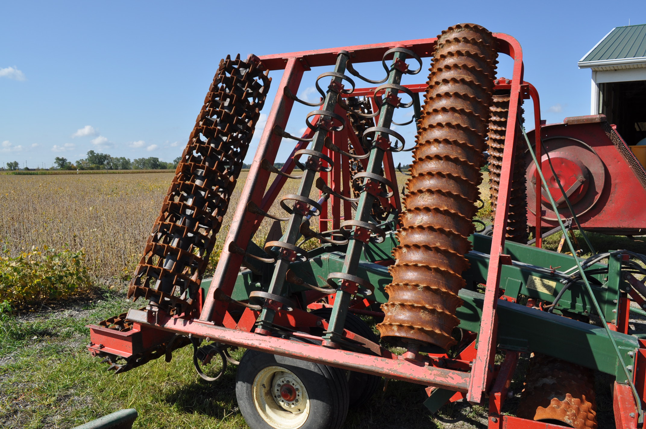 24’ Brillion cultimulcher, solid front wheels, s tines, rear crows foot ...