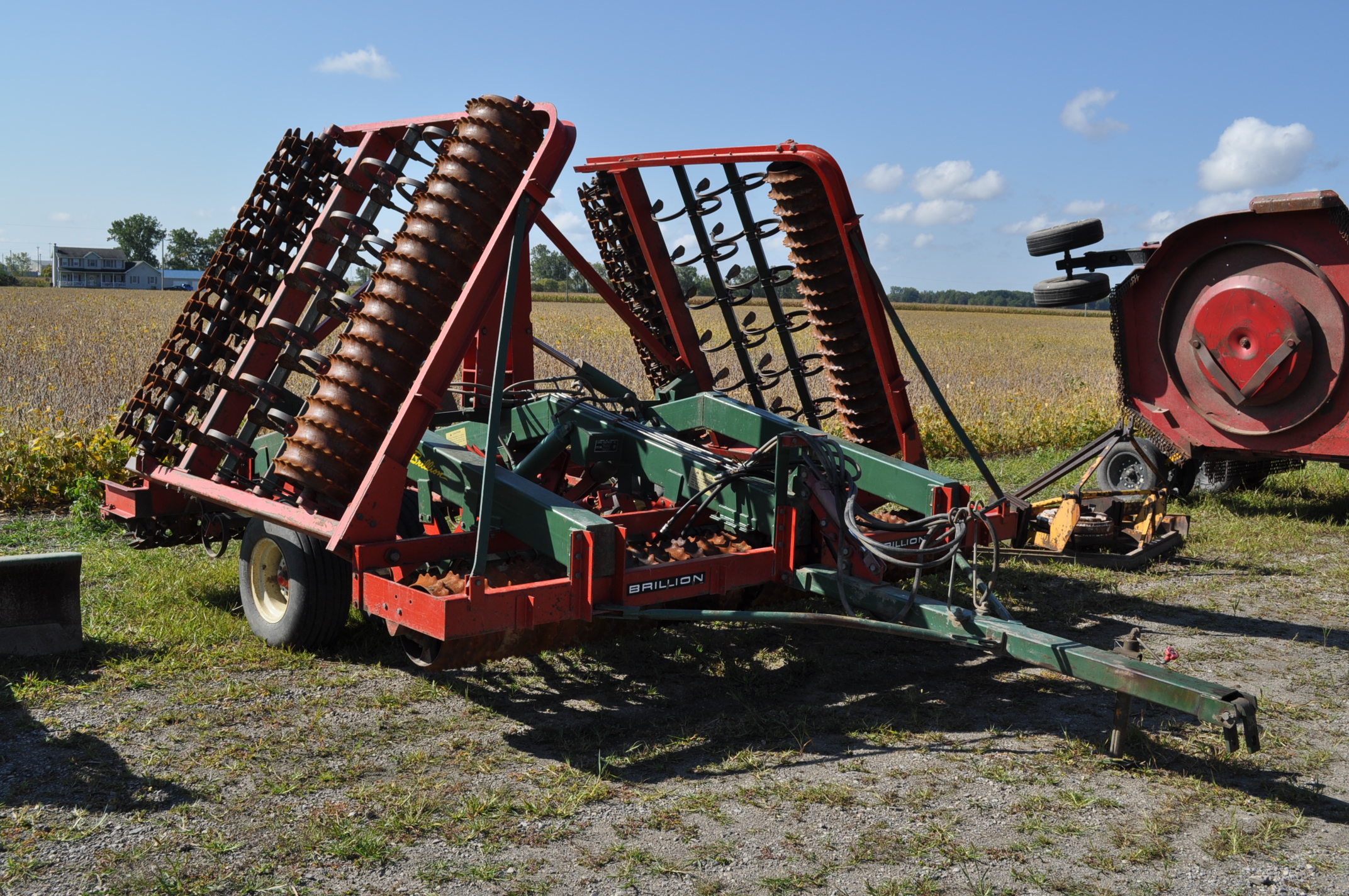 24’ Brillion cultimulcher, solid front wheels, s tines, rear crows foot ...
